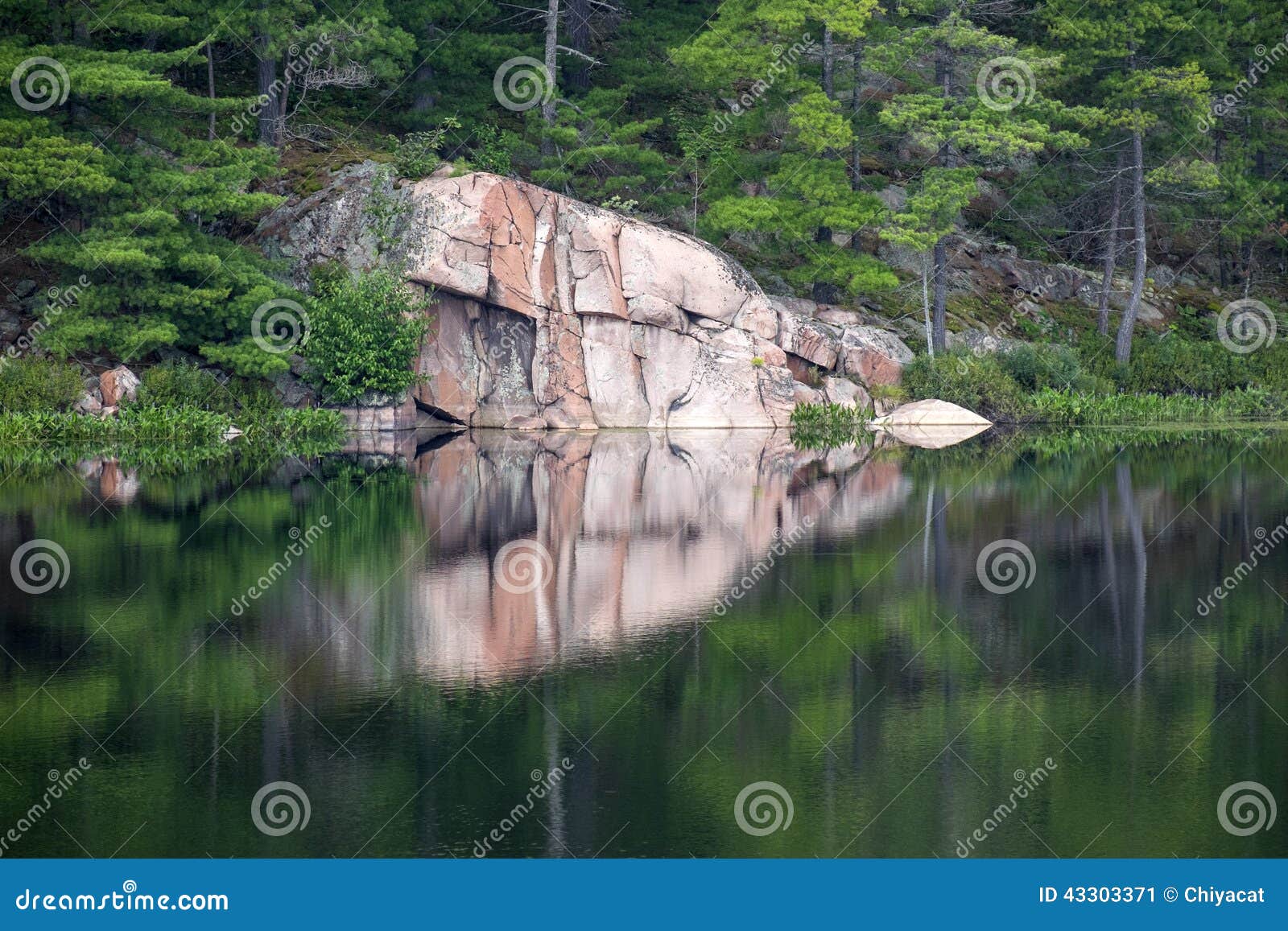 Reflection of Colorful Rock in the Lake Stock Image - Image of ...