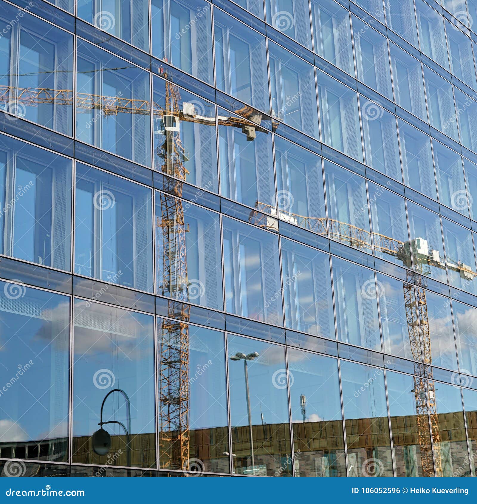 Reflection of a Construction Crane in a Glass Facade Stock Photo ...