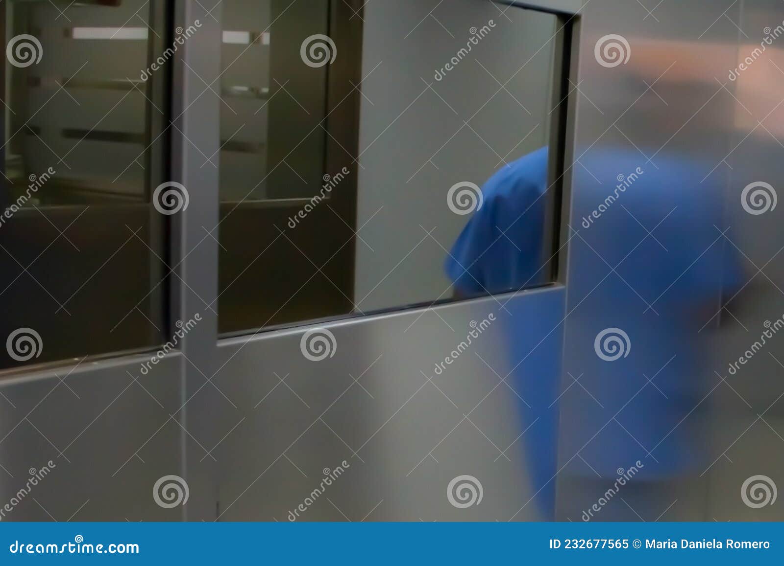 Reflection of a Doctor with His Back Turned in His Work Uniform Stock ...