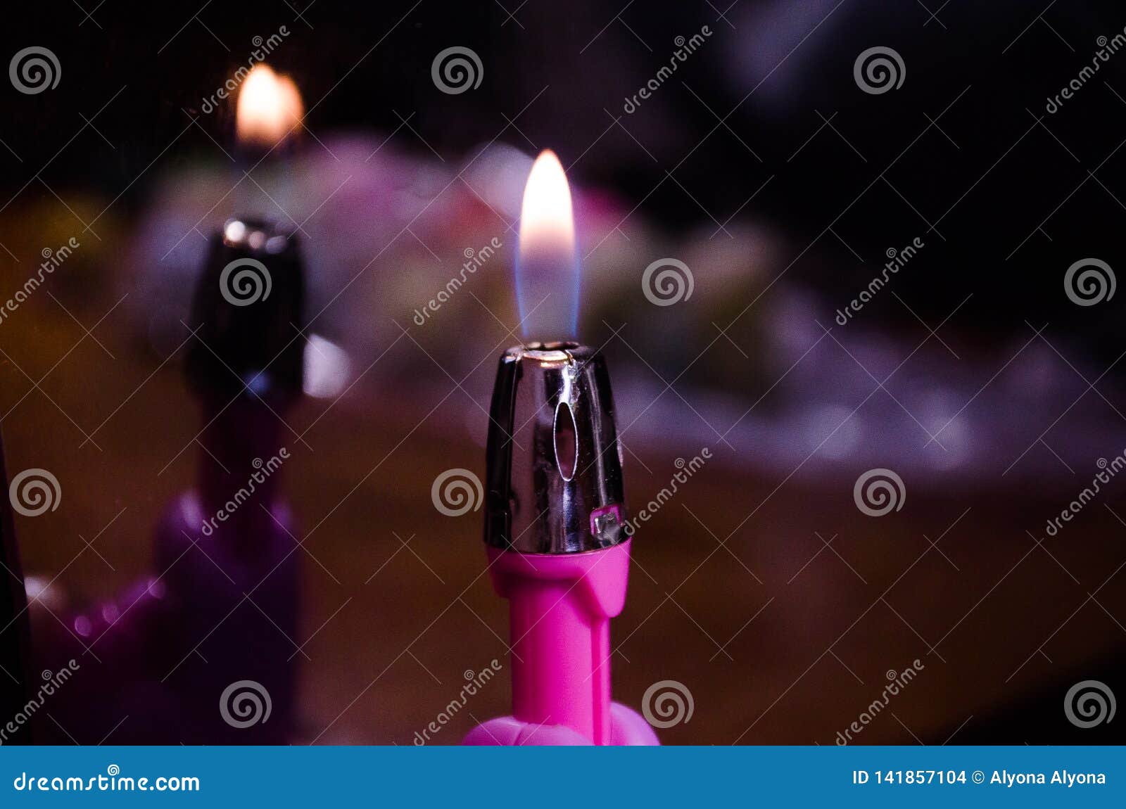 Reflection of Fire. Black Background and Lighter. Flame. Lighter Stock ...