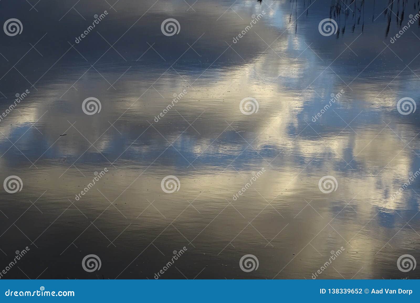 Reflection Fo Clouds in Mostly Still Water Stock Photo - Image of color ...