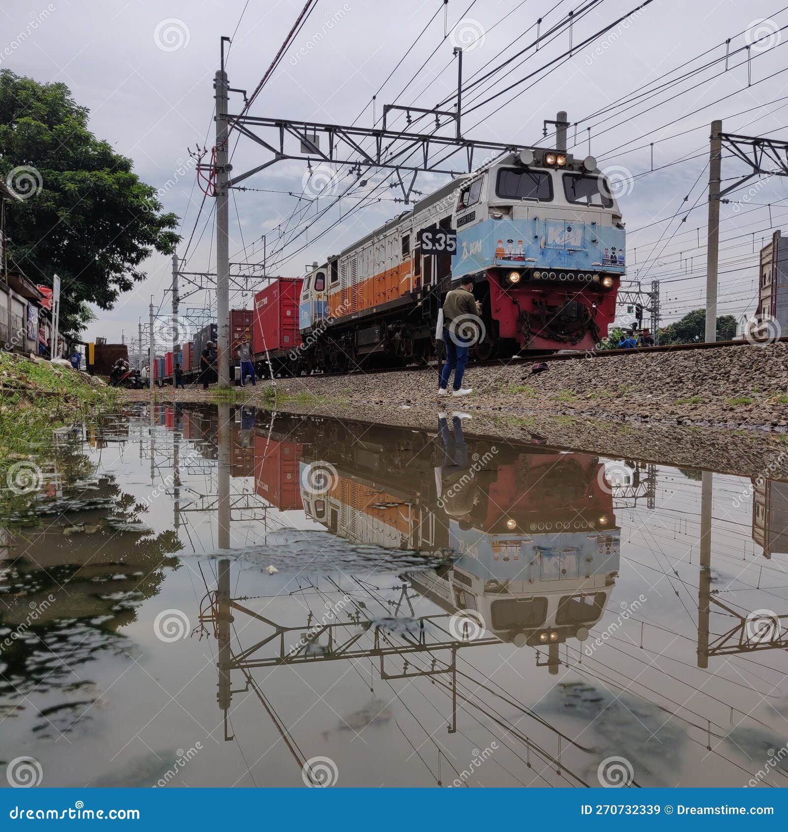 Reflection of the Freight Train in Puddle Stock Image - Image of speed ...