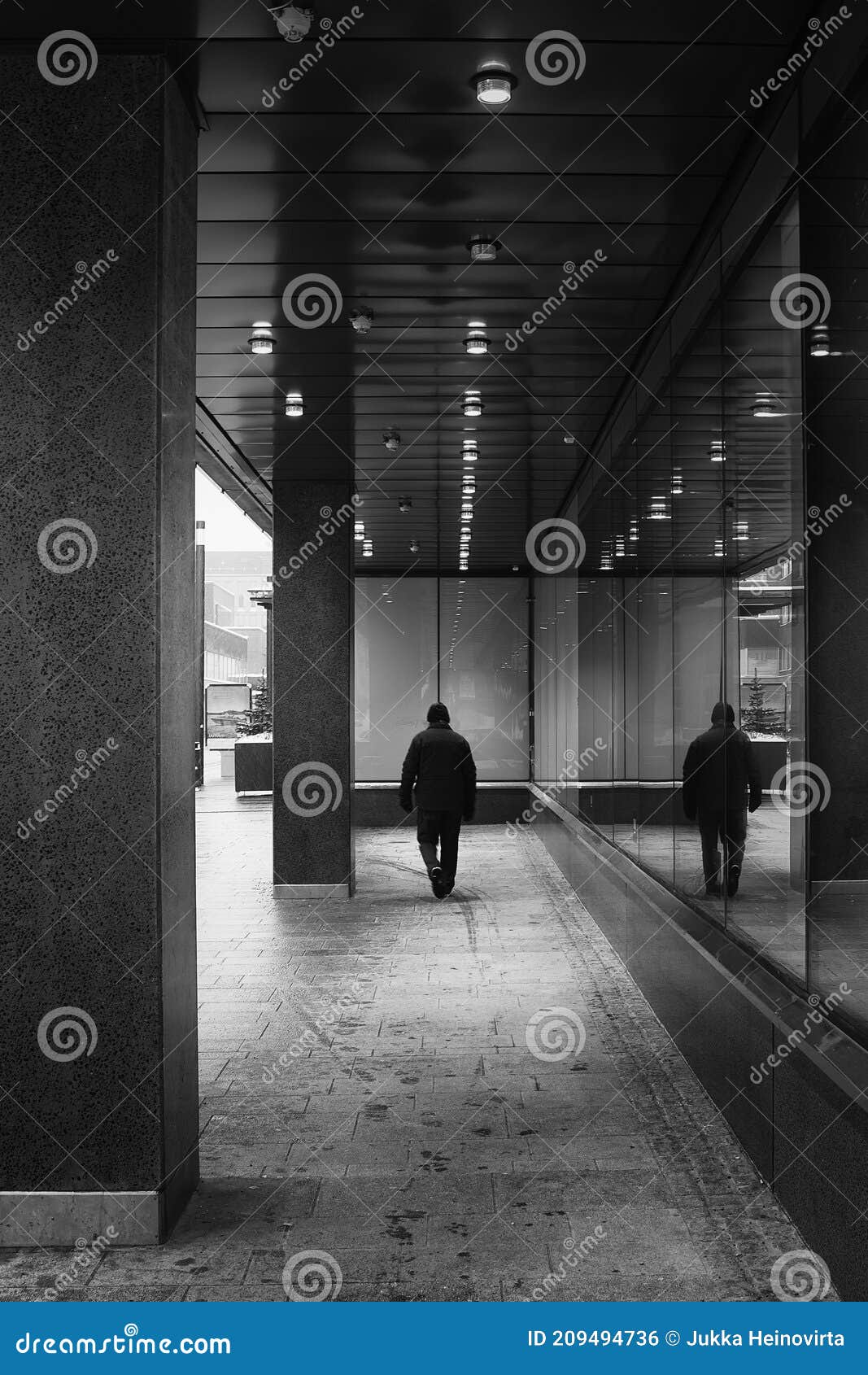 Reflection on a Glass Wall stock photo. Image of ceiling - 209494736