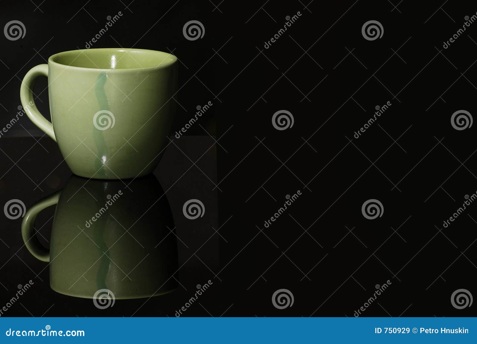 Reflection of green cup stock image. Image of reflection - 750929