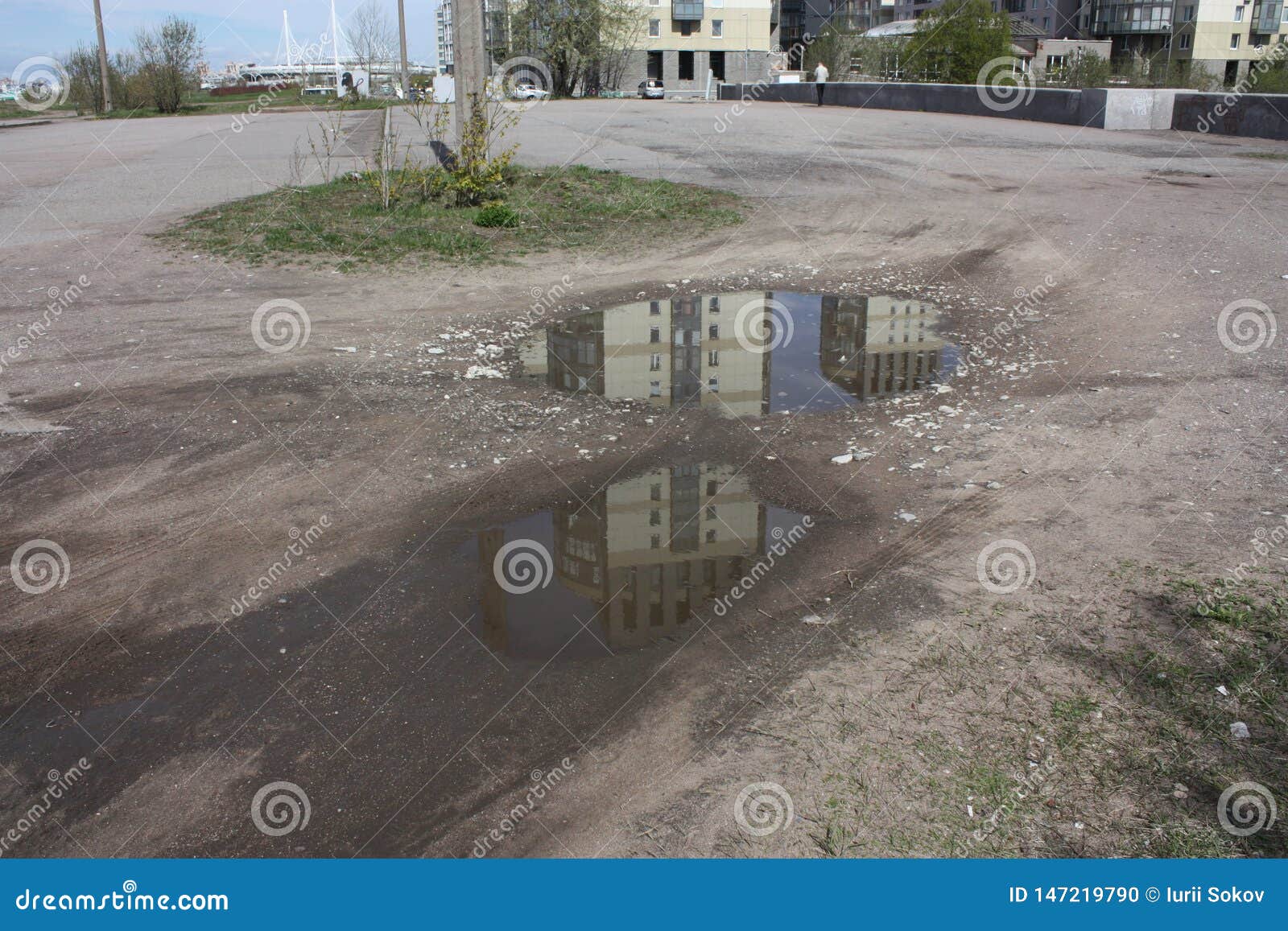 Reflection Homes in a Puddle of Court Stock Photo - Image of puddle ...