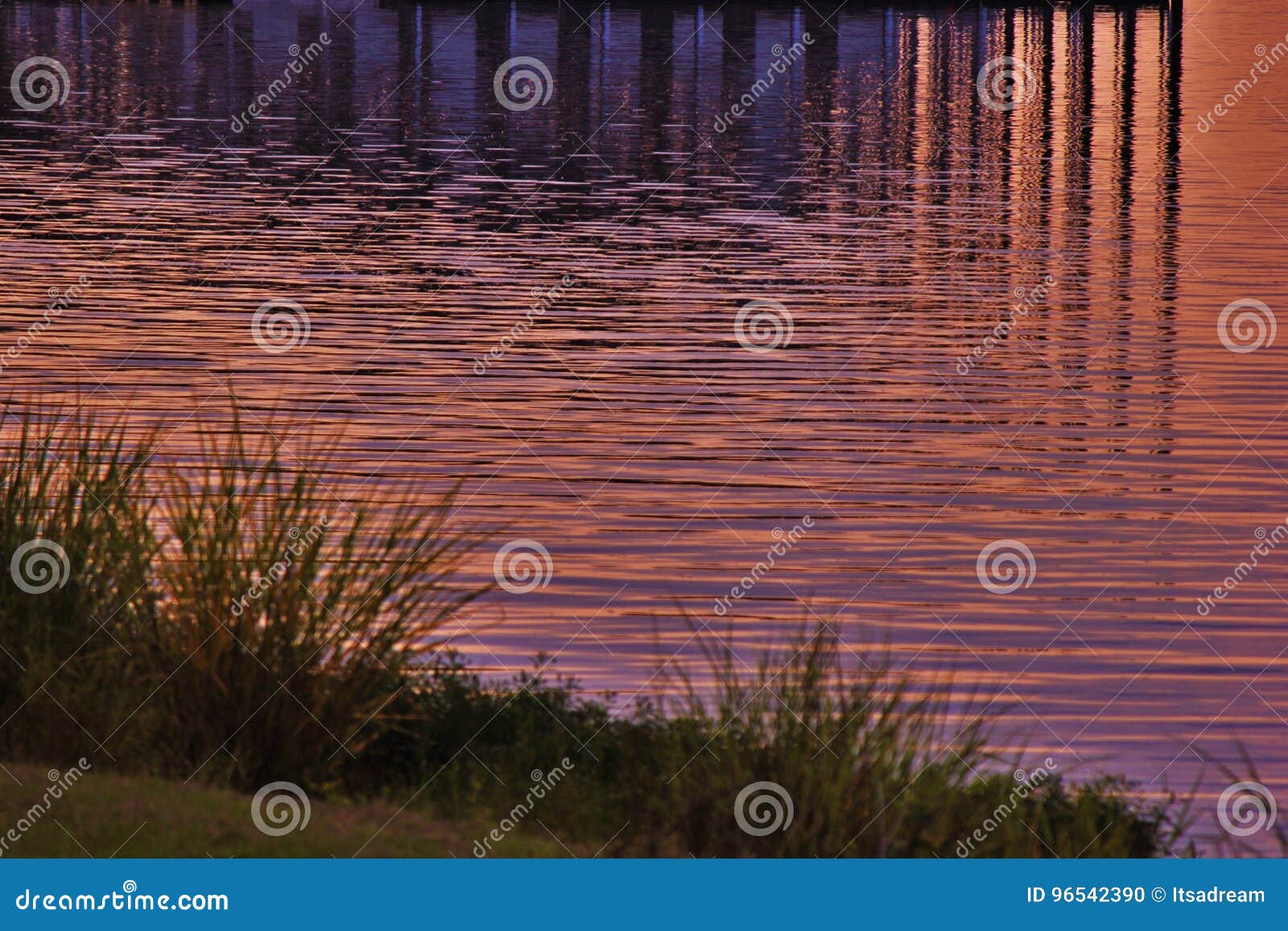 Reflection on lake water stock photo. Image of orange - 96542390