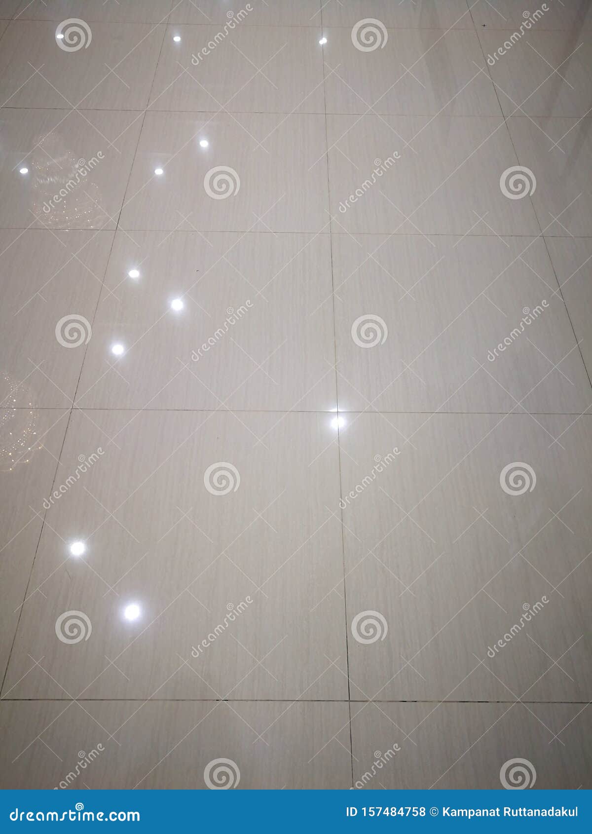 The Reflection of the Light from the Ceiling To the Polished Floor ...