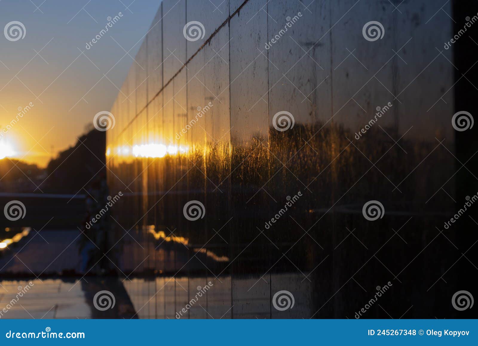 Reflection of Light on the Cladding. the Sunset Sun is Reflected in the ...