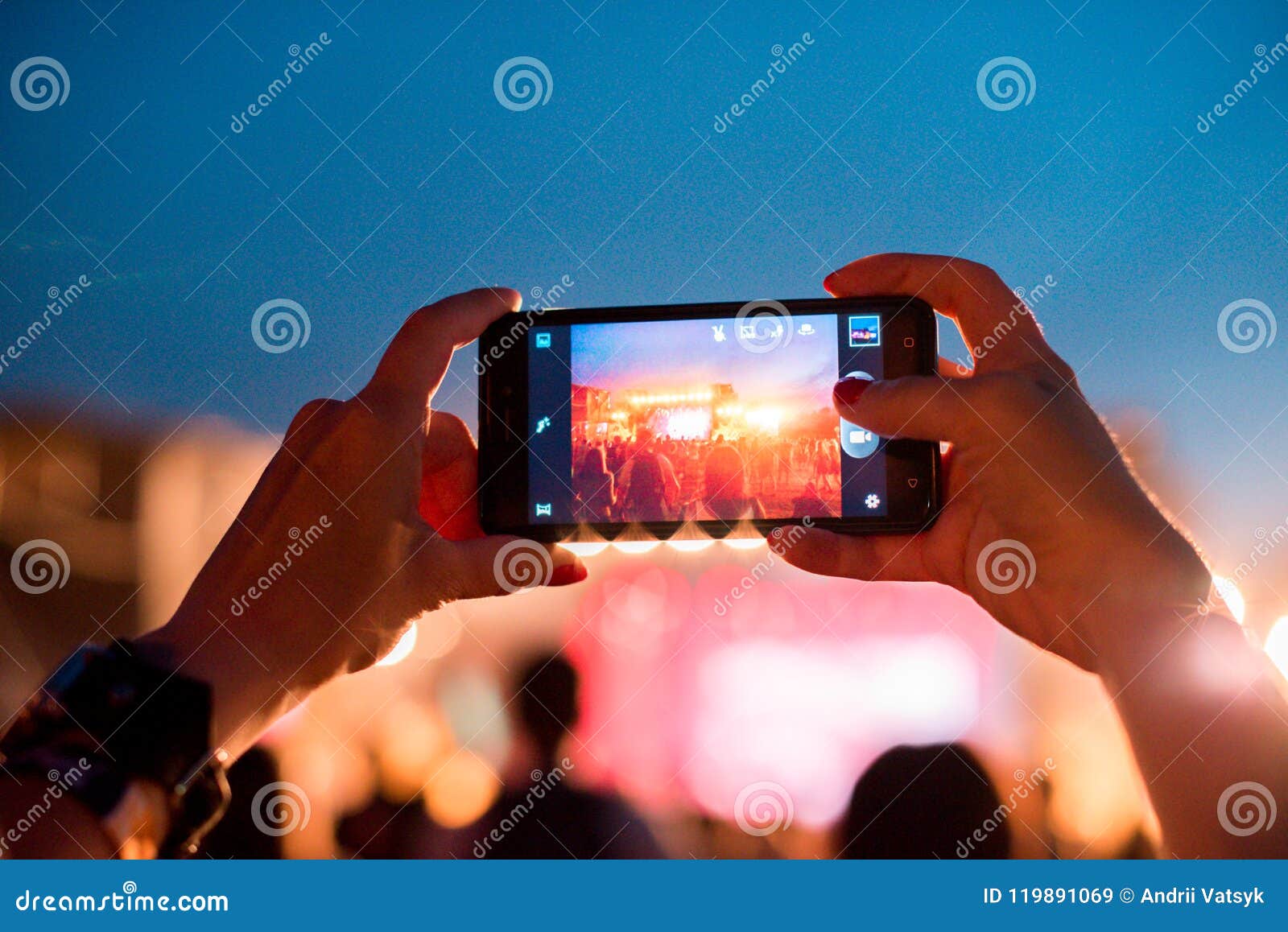 Reflection of Light Effects on Mobile Phone at a Concert Gadge Stock ...