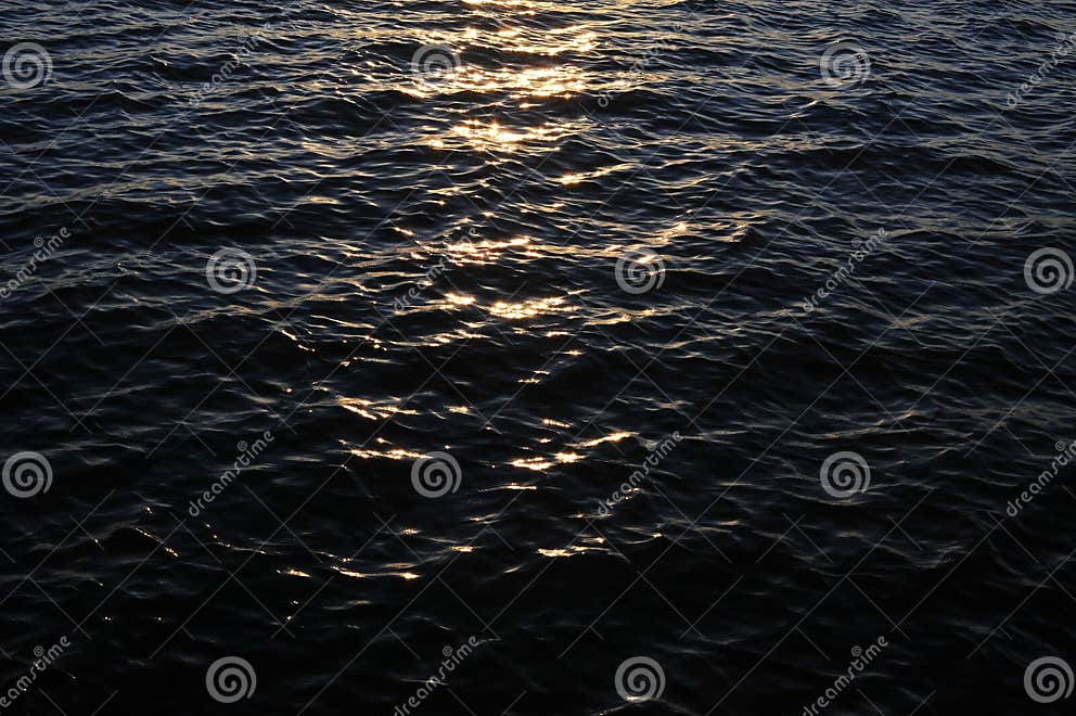 Reflection of Light on Water Surface in Sunset Stock Image - Image of ...