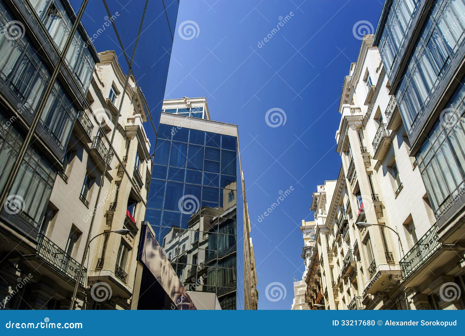 Reflection of Madrid Street in Modern Building Wall Stock Photo - Image ...