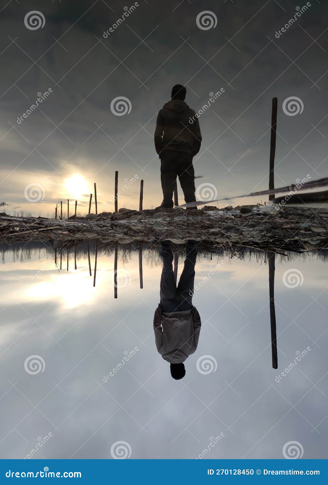 Reflection of a Man in Water during Sunset Stock Photo - Image of ...