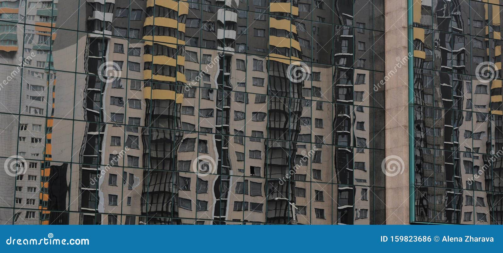 Reflection in the Mirror Building of a Multi-storey Building on ...