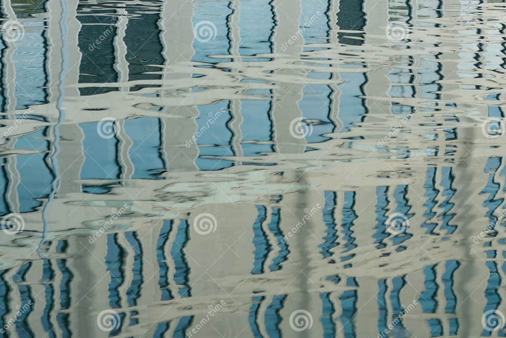 Reflection of a Modern Building on the Surface of the Water Stock Photo ...
