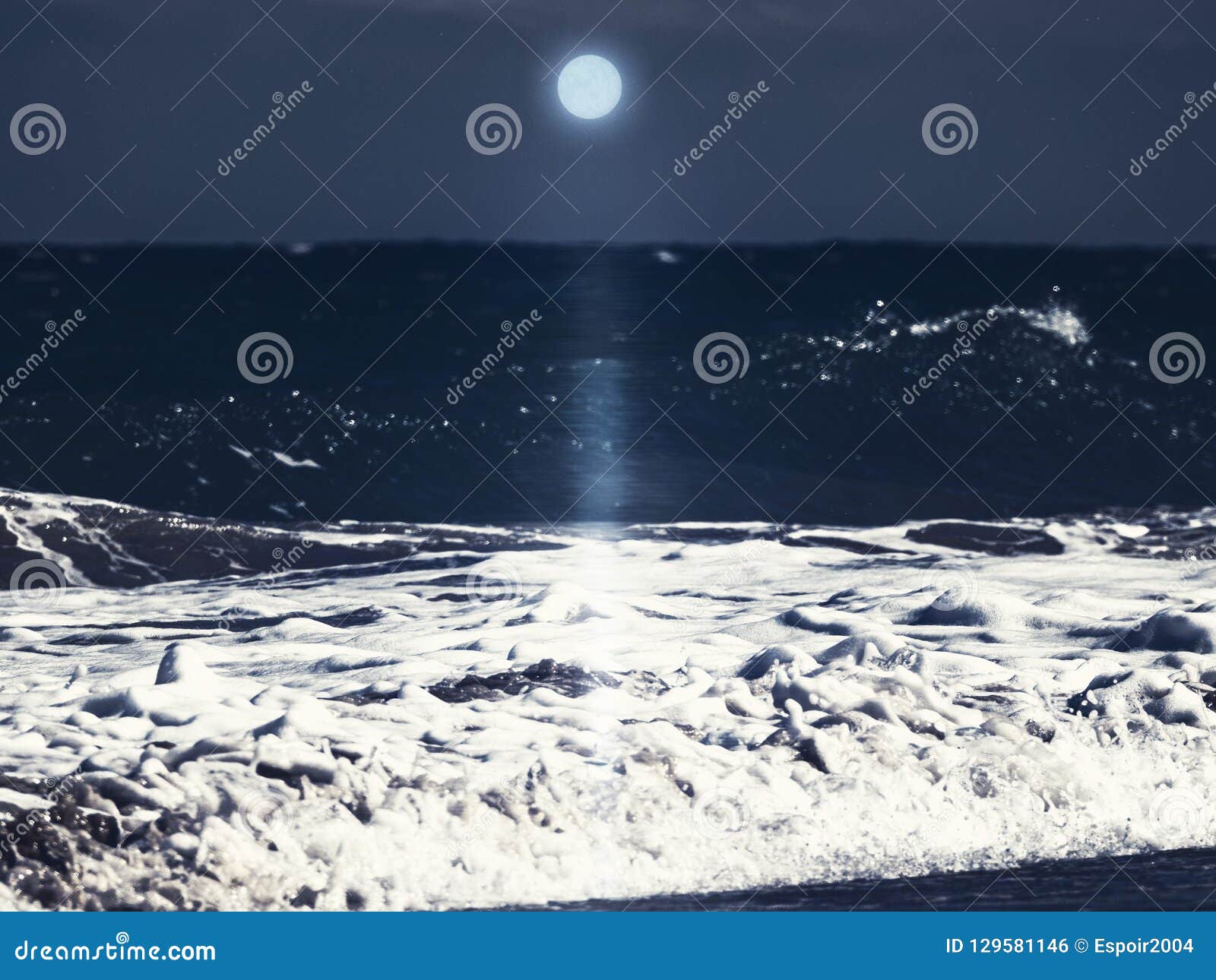 Reflection of the Moon in the Waves of the Ocean Stock Photo - Image of ...