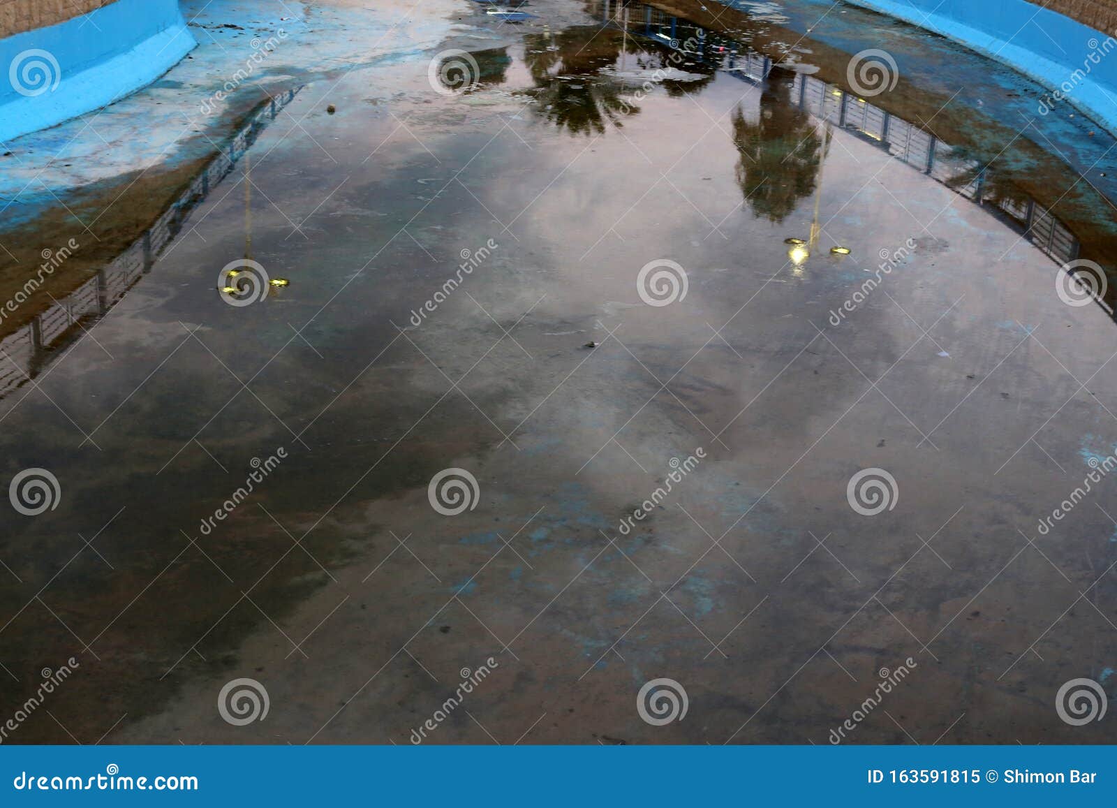 Reflection of Objects on a Glass and Water Surface. Stock Image - Image ...