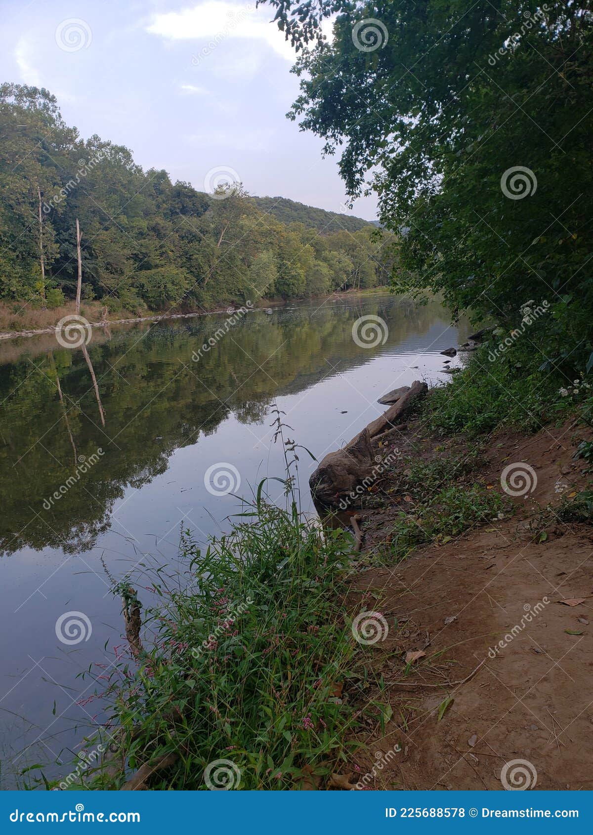 Reflection off water stock photo. Image of water, cliff - 225688578