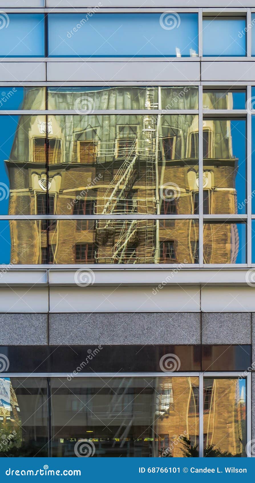 Reflection of Old High-Rise Brick Building in New Modern High-Rise ...