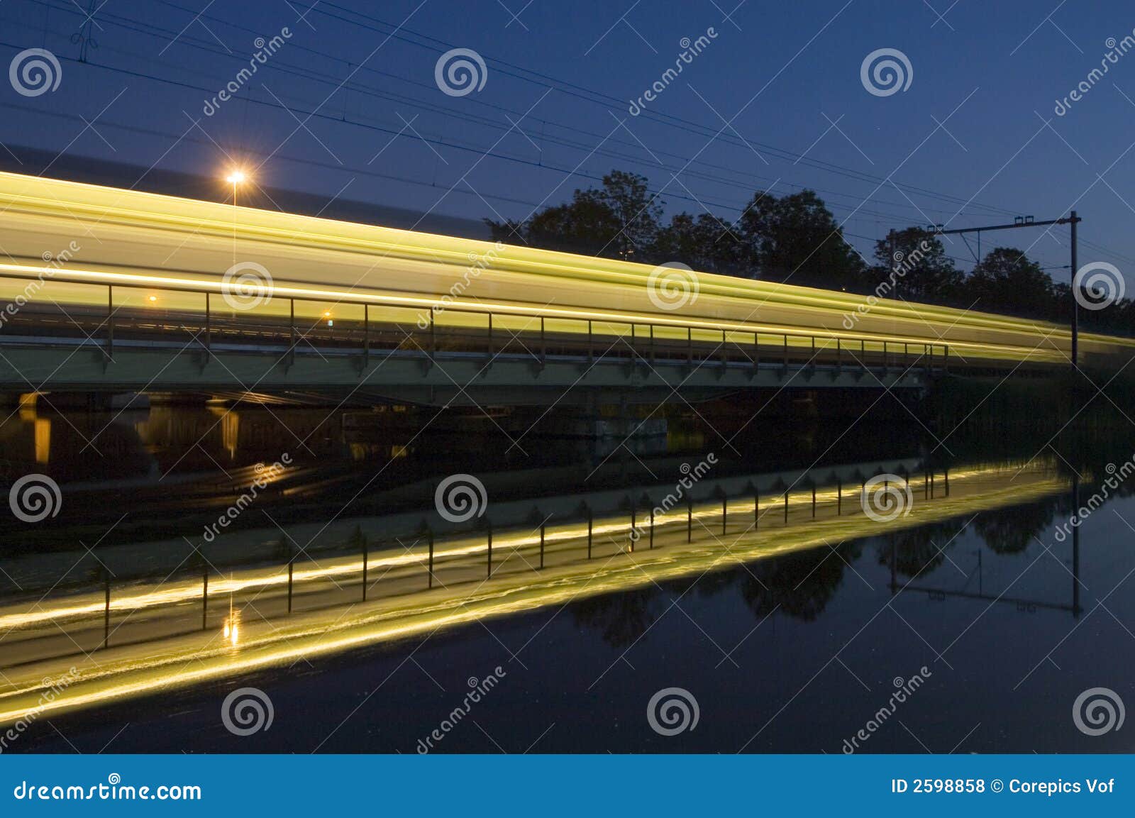 Reflection of a Passing Train Stock Photo - Image of twilight ...