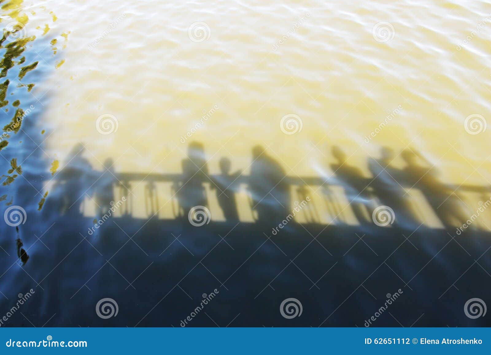 Reflection of People on the Water Stock Photo - Image of reflection ...