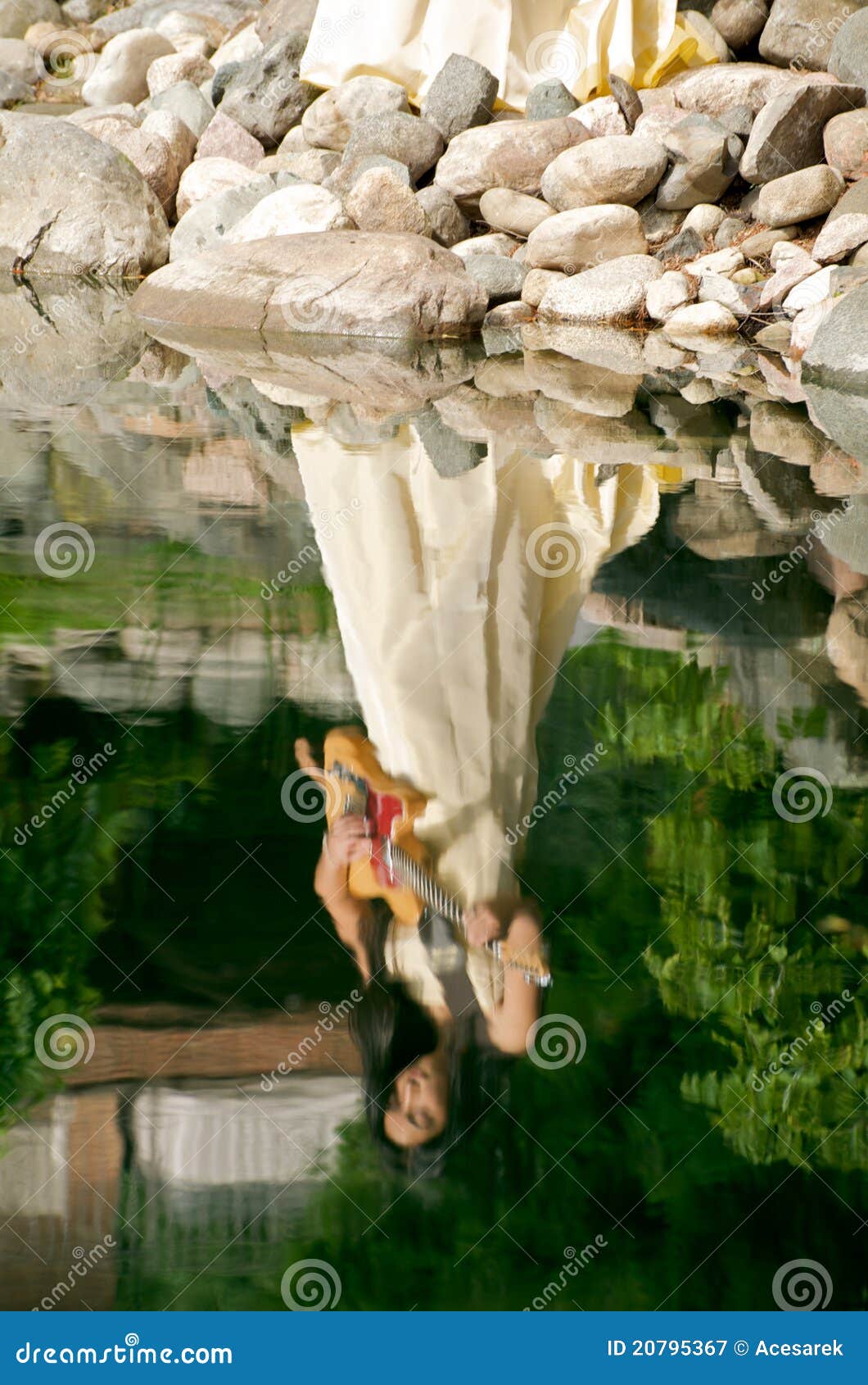 Reflection in Pond of Girl Playing Guitar Stock Image - Image of lake ...