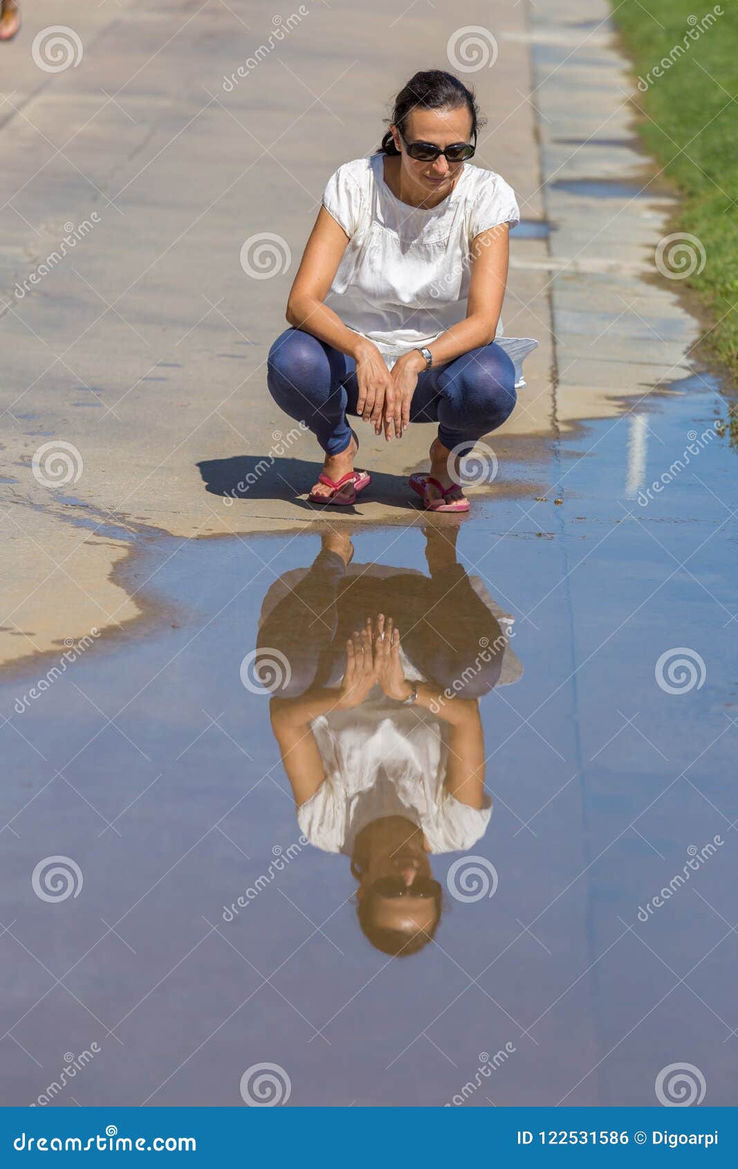 Reflection a Pretty Women in a Passage on a Puddle Stock Photo - Image ...