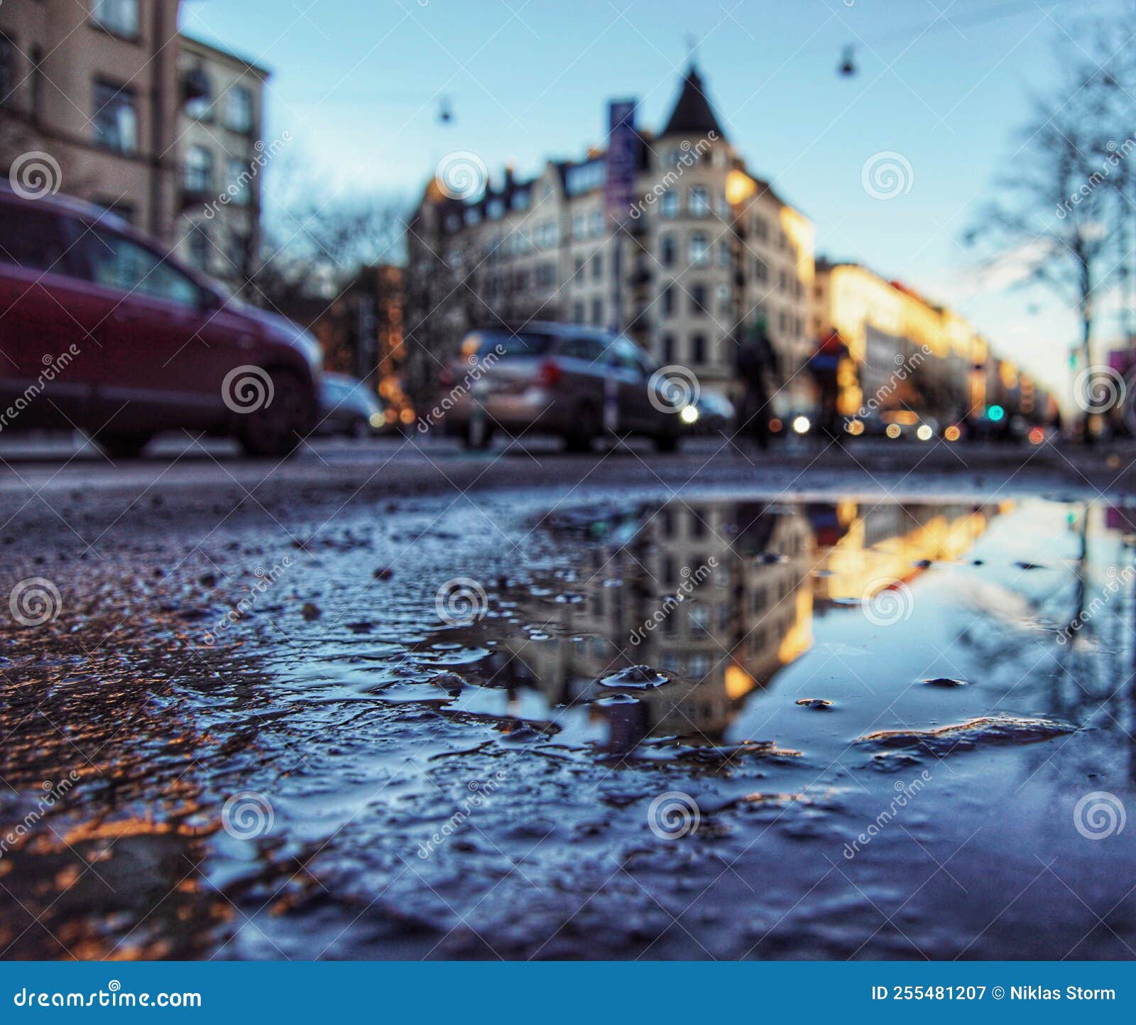 Reflection in Puddle at Street in City Stock Image - Image of snow ...