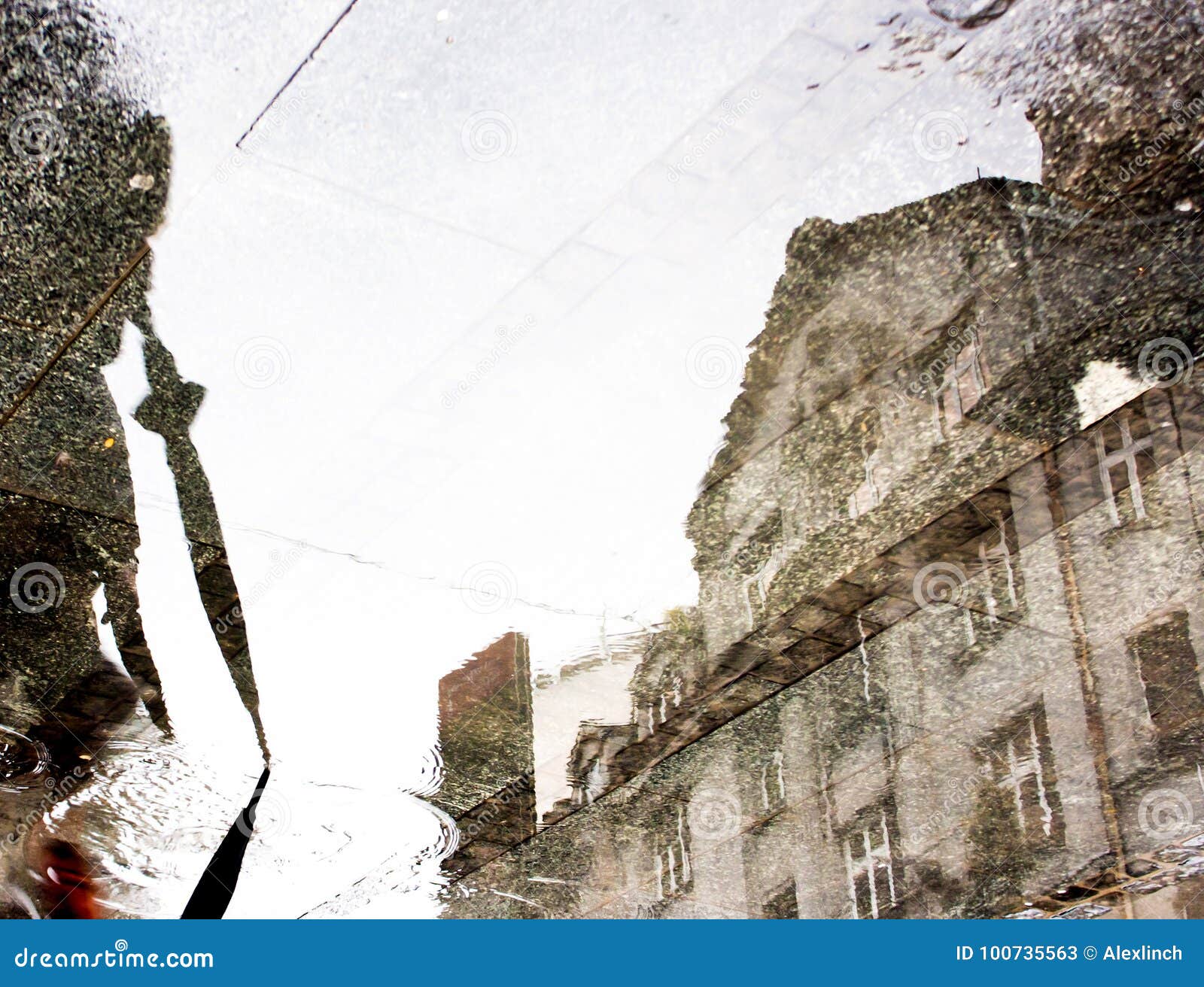 City Reflection in a Puddle Stock Image - Image of background, city ...