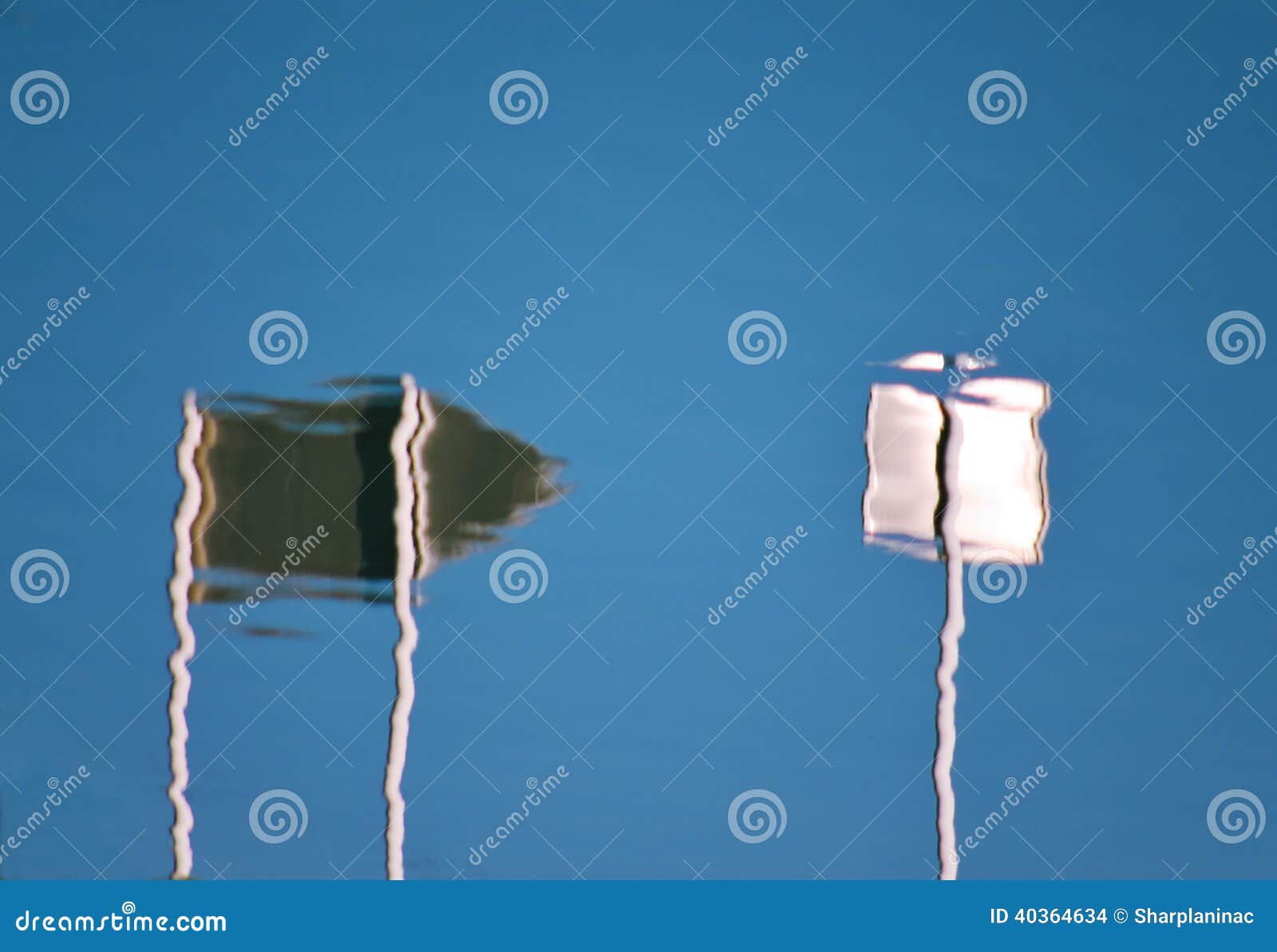 Reflection of Signs in the Water Stock Photo - Image of arrow, empty ...