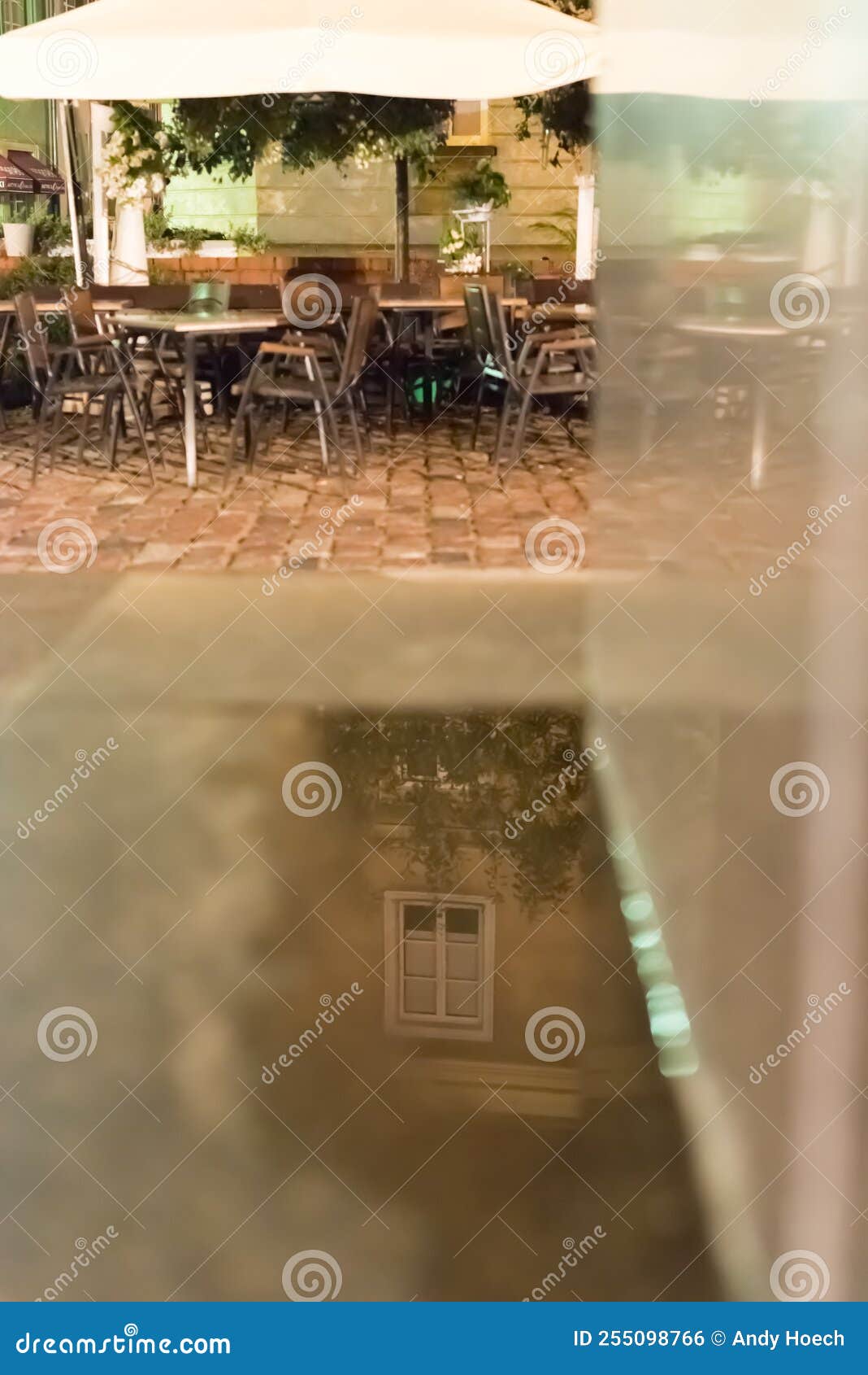 A Reflection of a Single Window in Front of a Restaurant Stock Photo ...