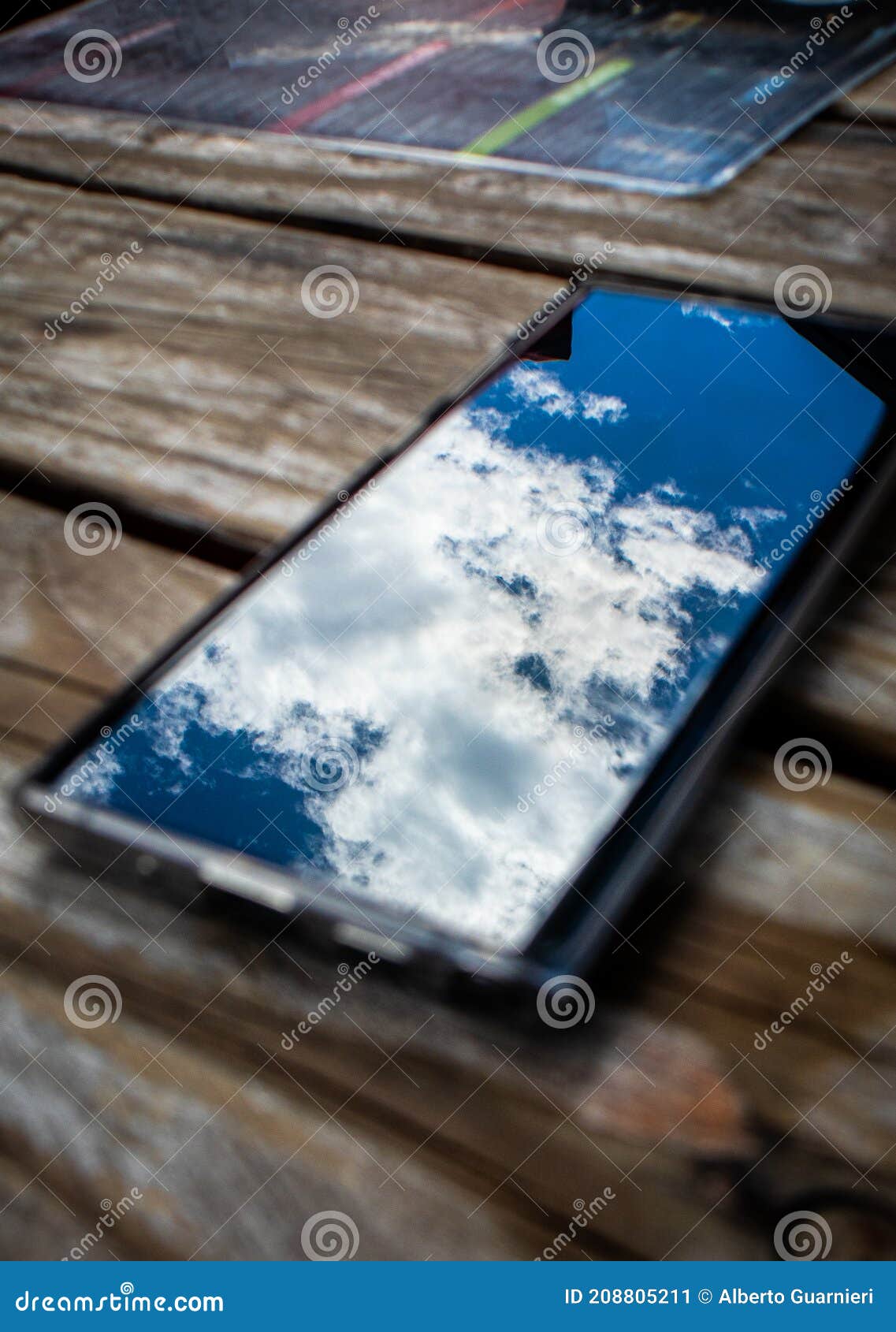 Reflection of Sky and Clouds on Cellphone Stock Image - Image of phone ...