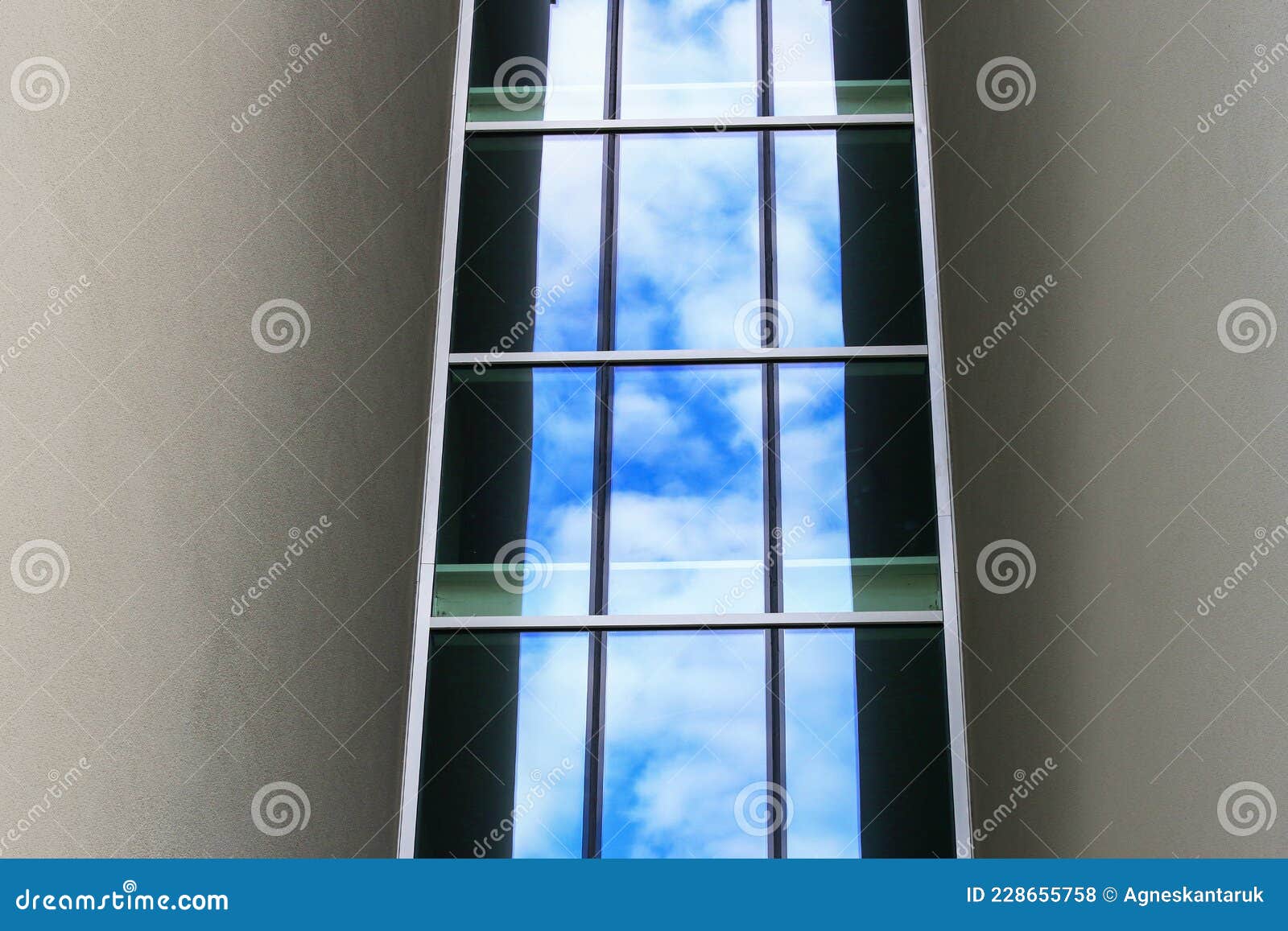 Reflection of the Sky in the Glass Facade of the Building Stock Photo ...