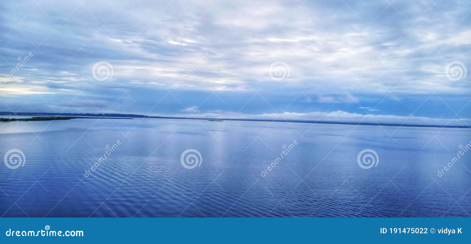 Reflection of sky in river stock photo. Image of river - 191475022