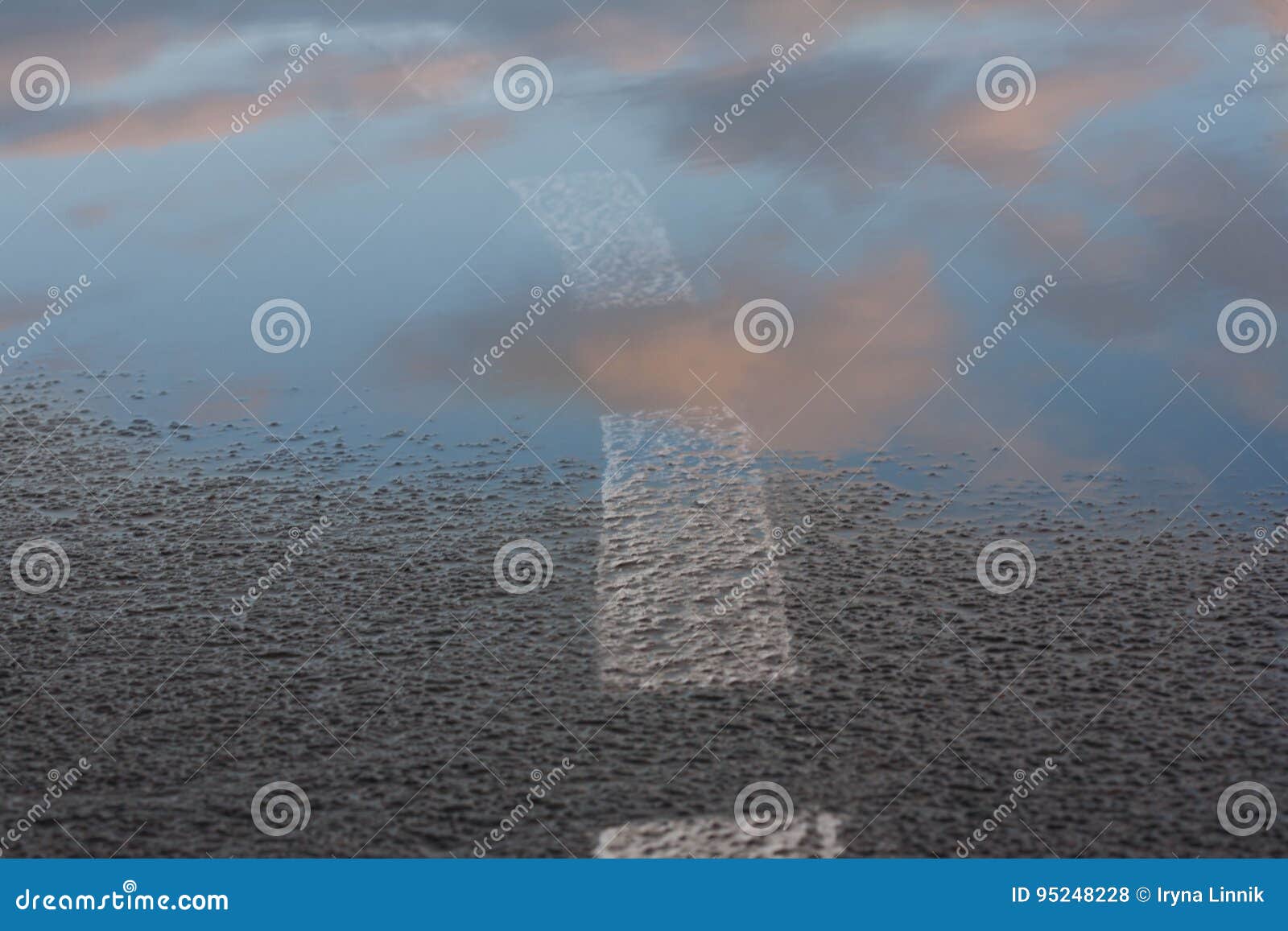 Reflection of the Sky in the Wet Asphalt and Puddle after the Rain, in ...