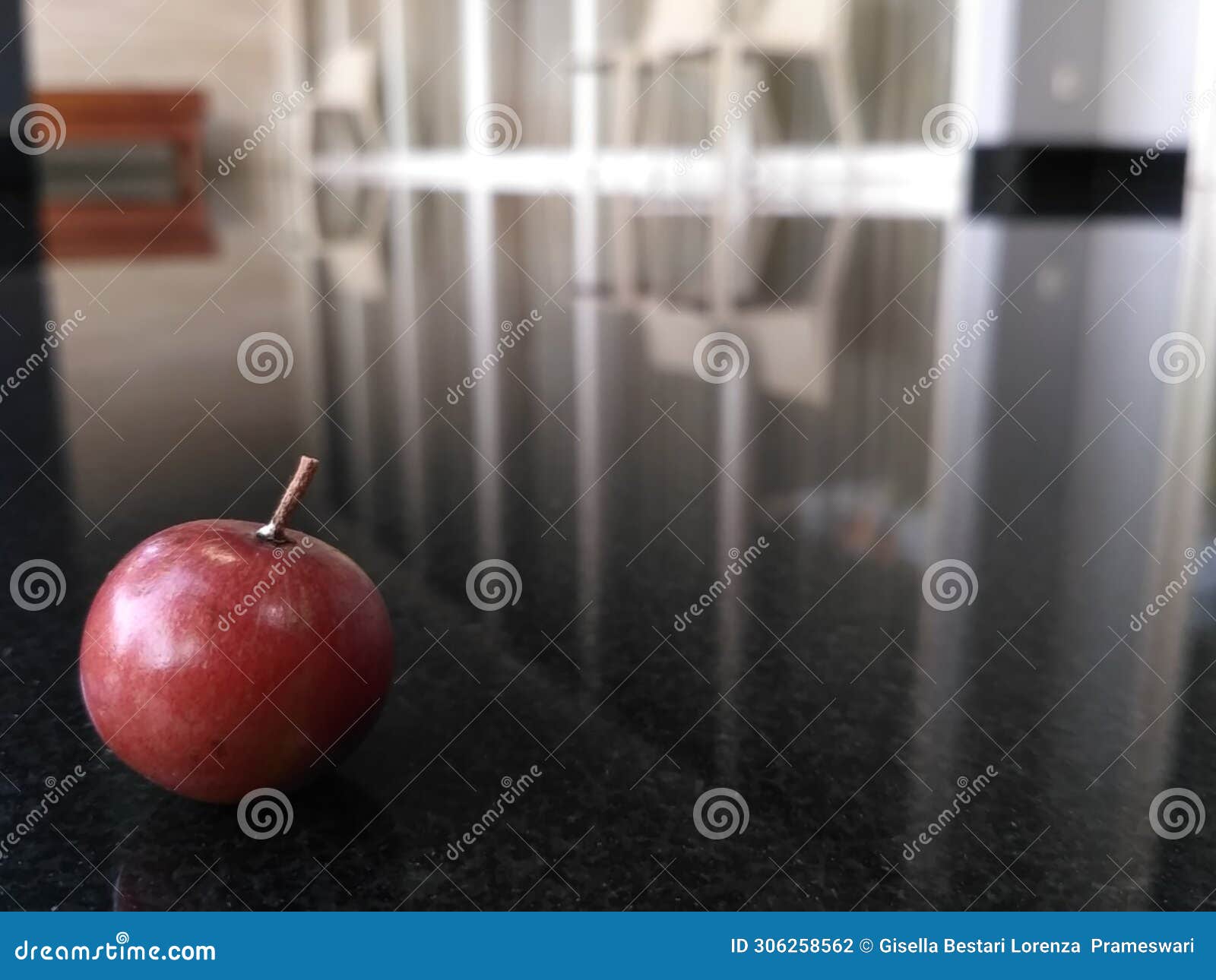 Reflection from Small Fruit on the Black Granite Stock Photo - Image of ...