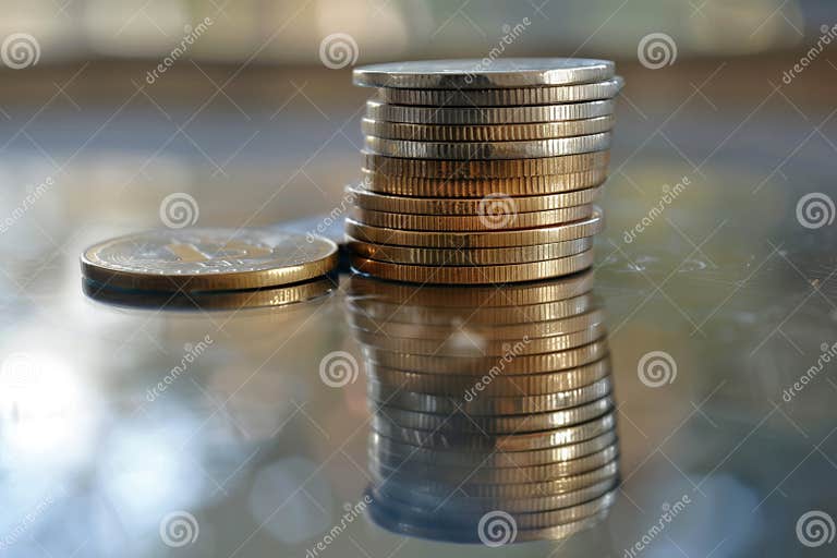 Reflection of a Stack of Coins on Glossy Surface Stock Photo - Image of ...