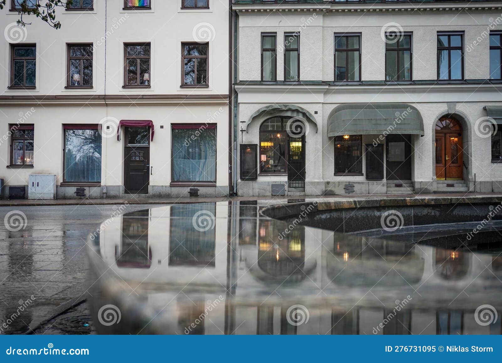 Reflection in Stone Structure in Front of a Residential Building Stock ...