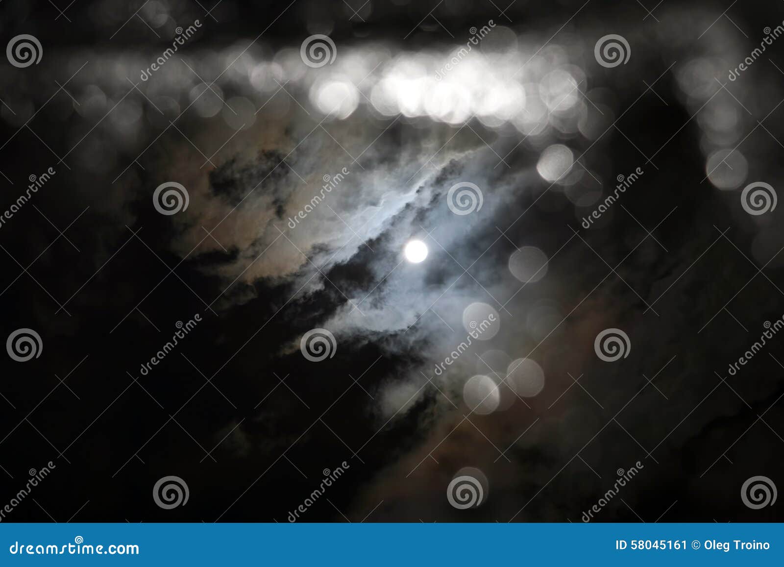Reflection of the Sun and Clouds in a Puddle of Water Stock Image ...