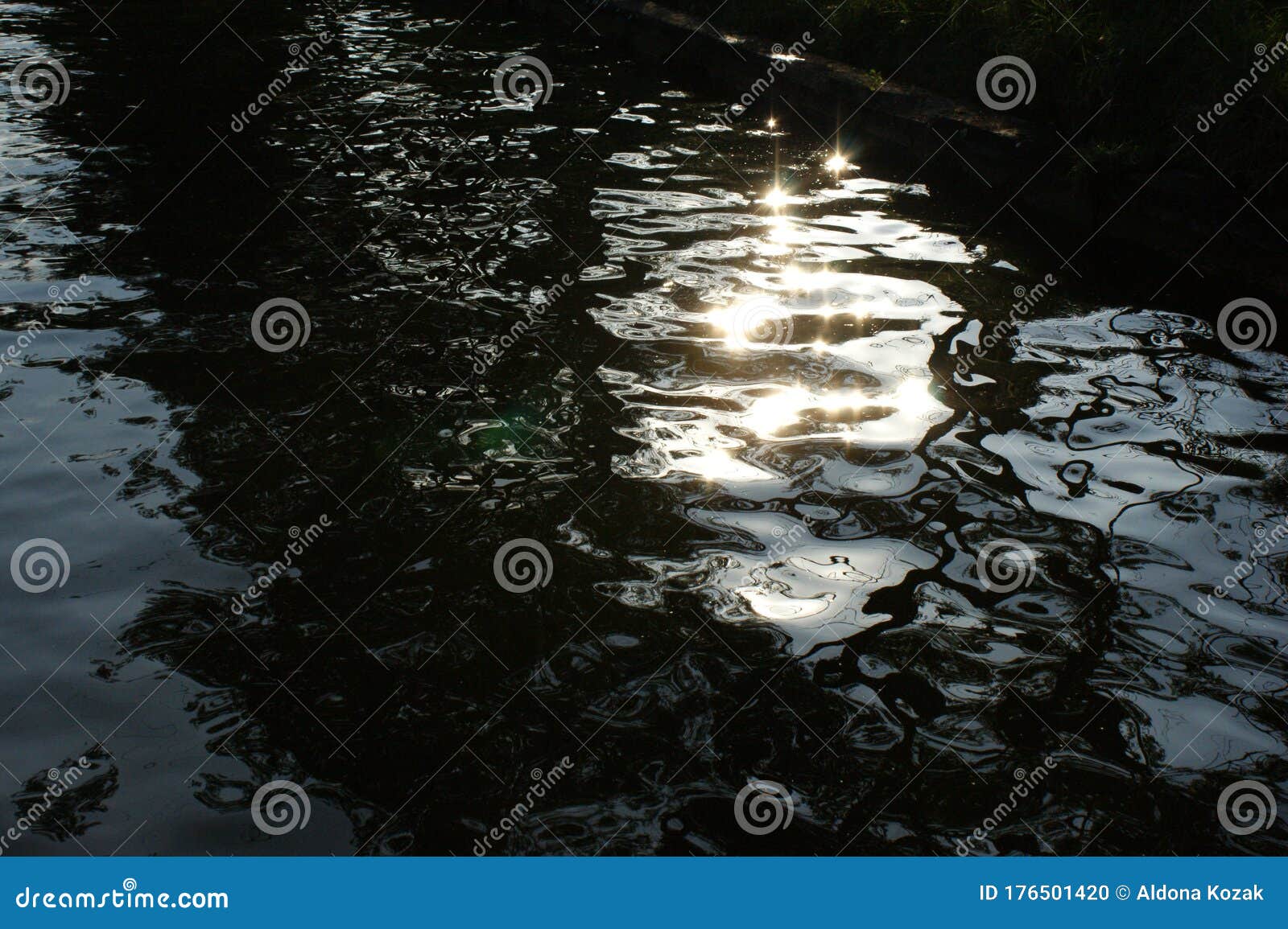 Reflection of the Sun in the Water Stock Photo - Image of dark, water ...