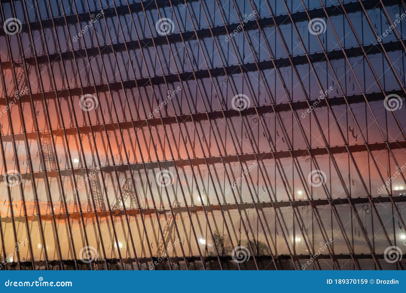 Reflection of the Sunset Sky in a Glass Facade of the Building ...