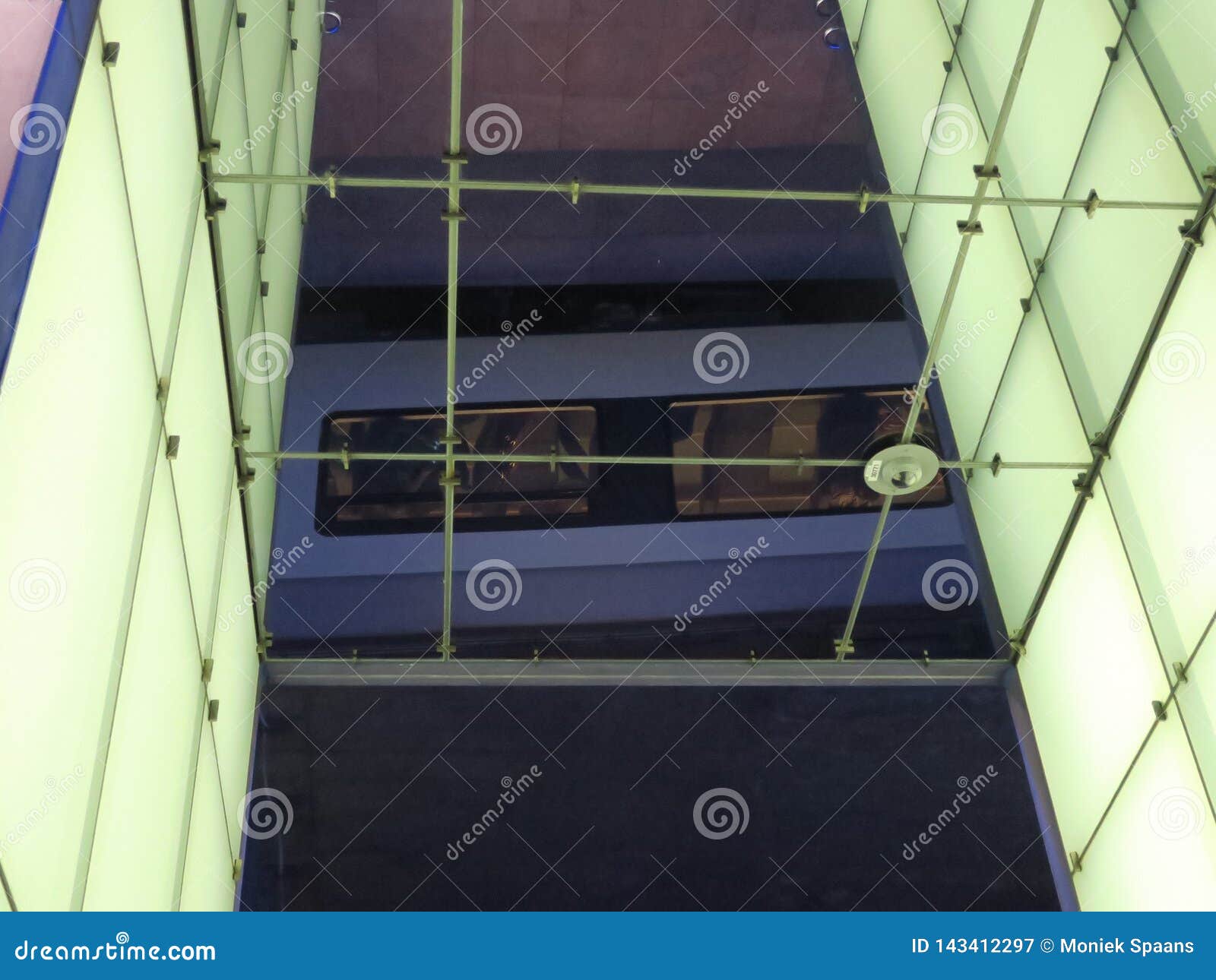 Reflection of a Train in a Mirror of a Ceiling in the Railway Station ...