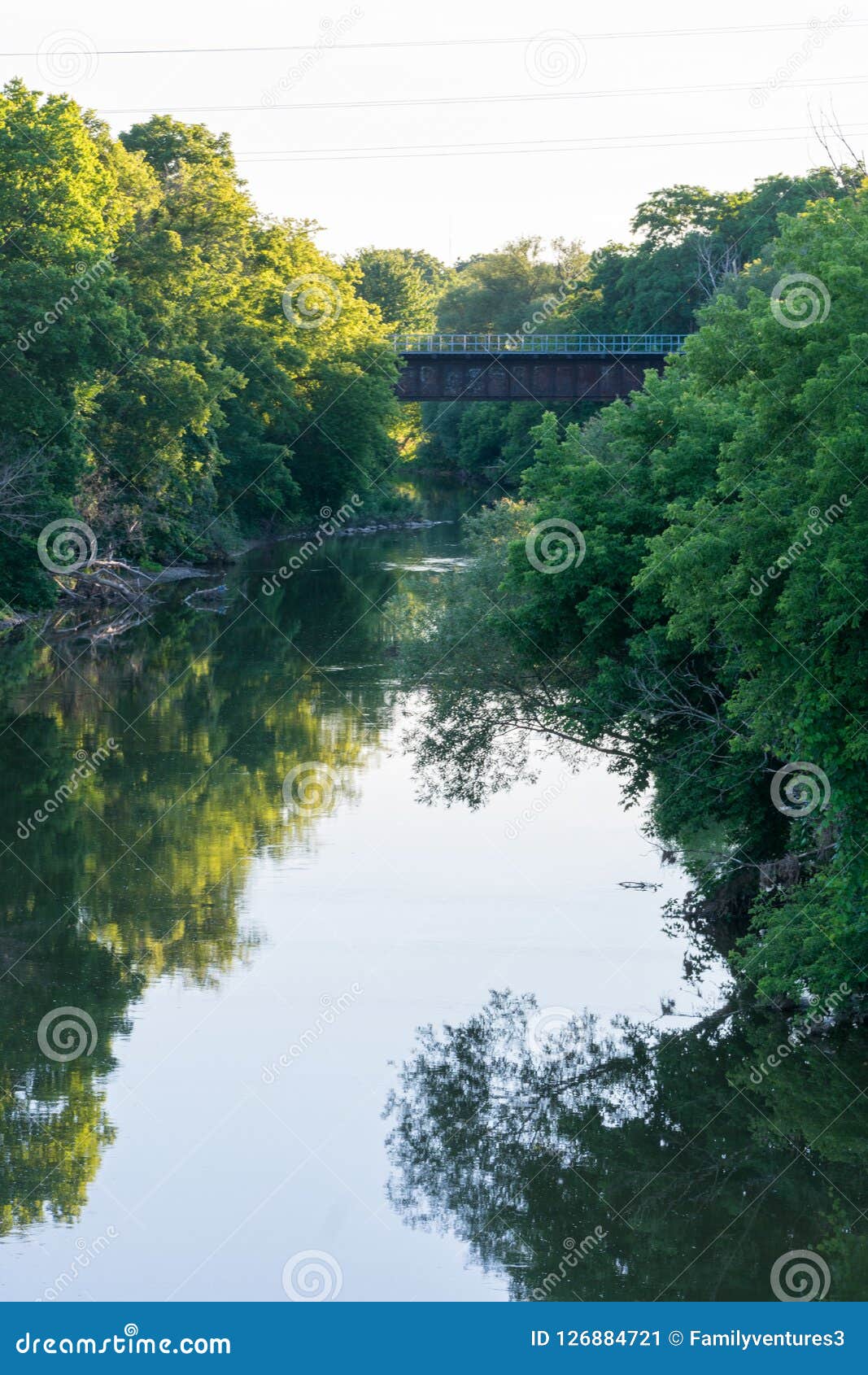 A Quiet River with the Trees Reflecting in the Water Stock Image ...