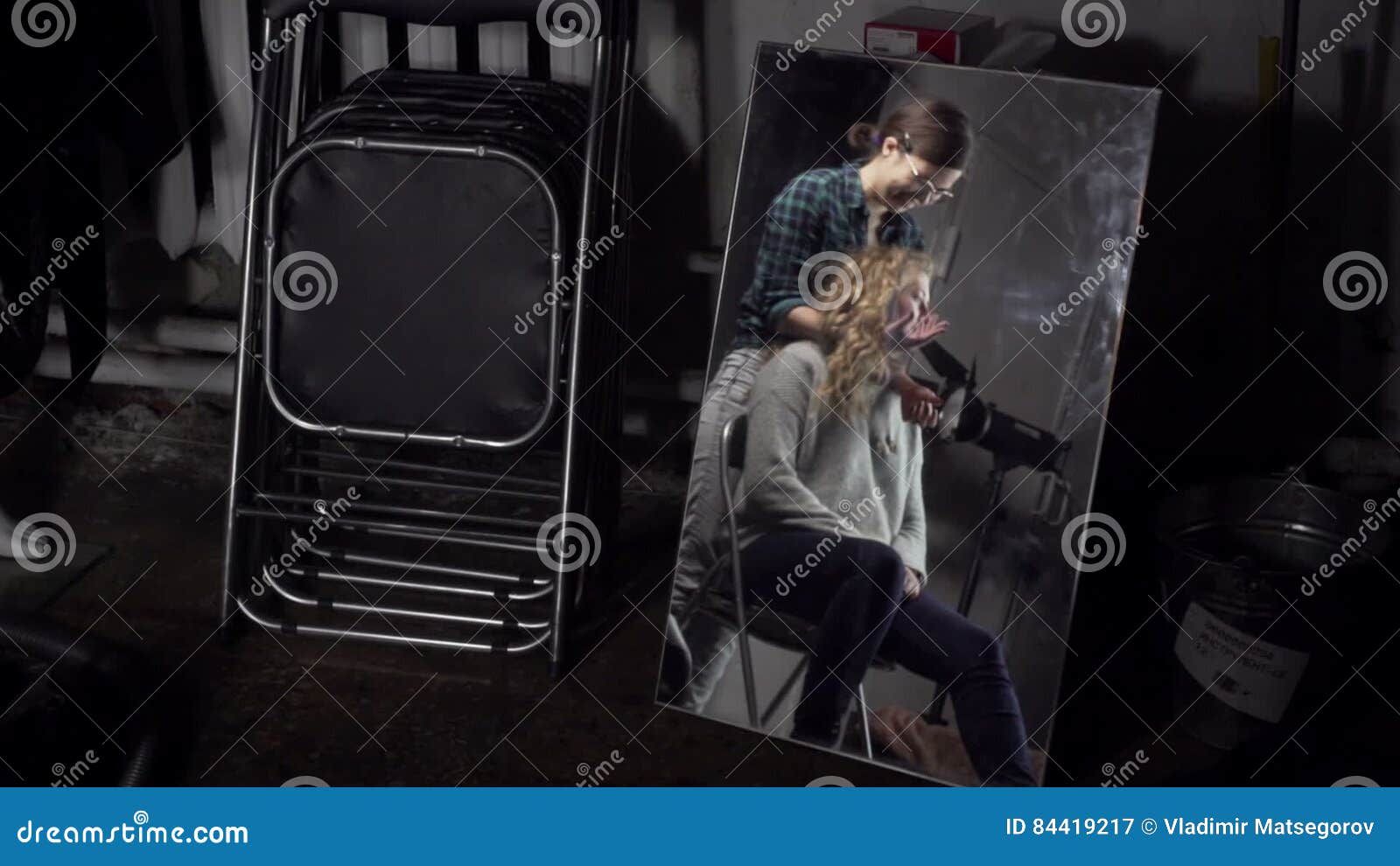 Reflection of Two Girls in a Mirror during a Photocall Stock Video ...