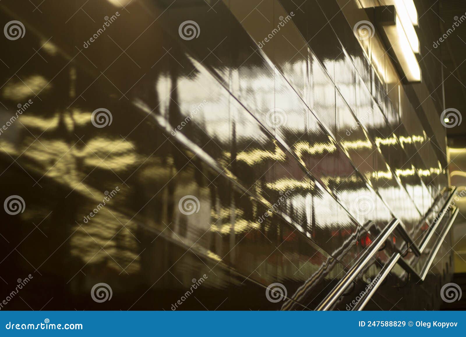 Reflection in Wall of Light. Handrail for Climbing Stairs Stock Image ...