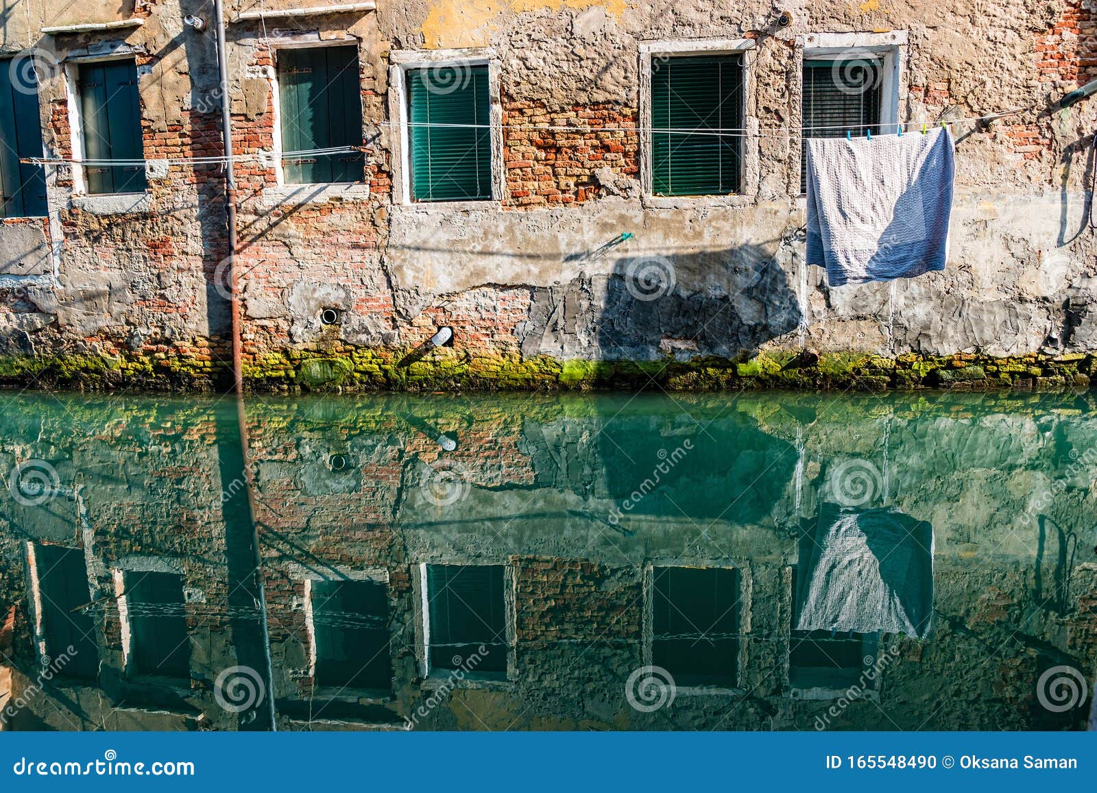 Reflection in the Water Channel of Venice, Italy Stock Photo - Image of ...