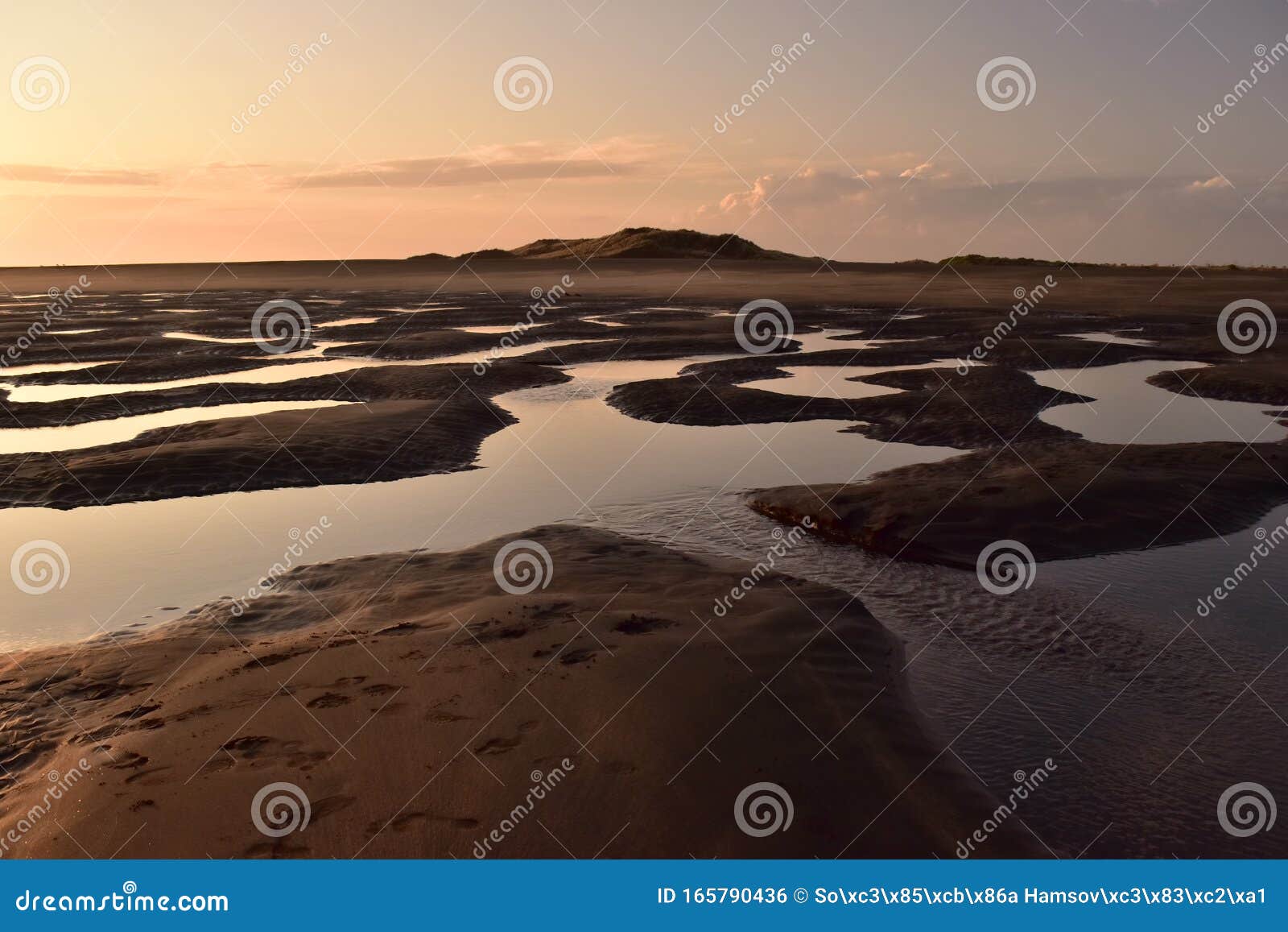 A Small Puddles in the Sand after Low Tide in Sunset Light Stock Photo ...