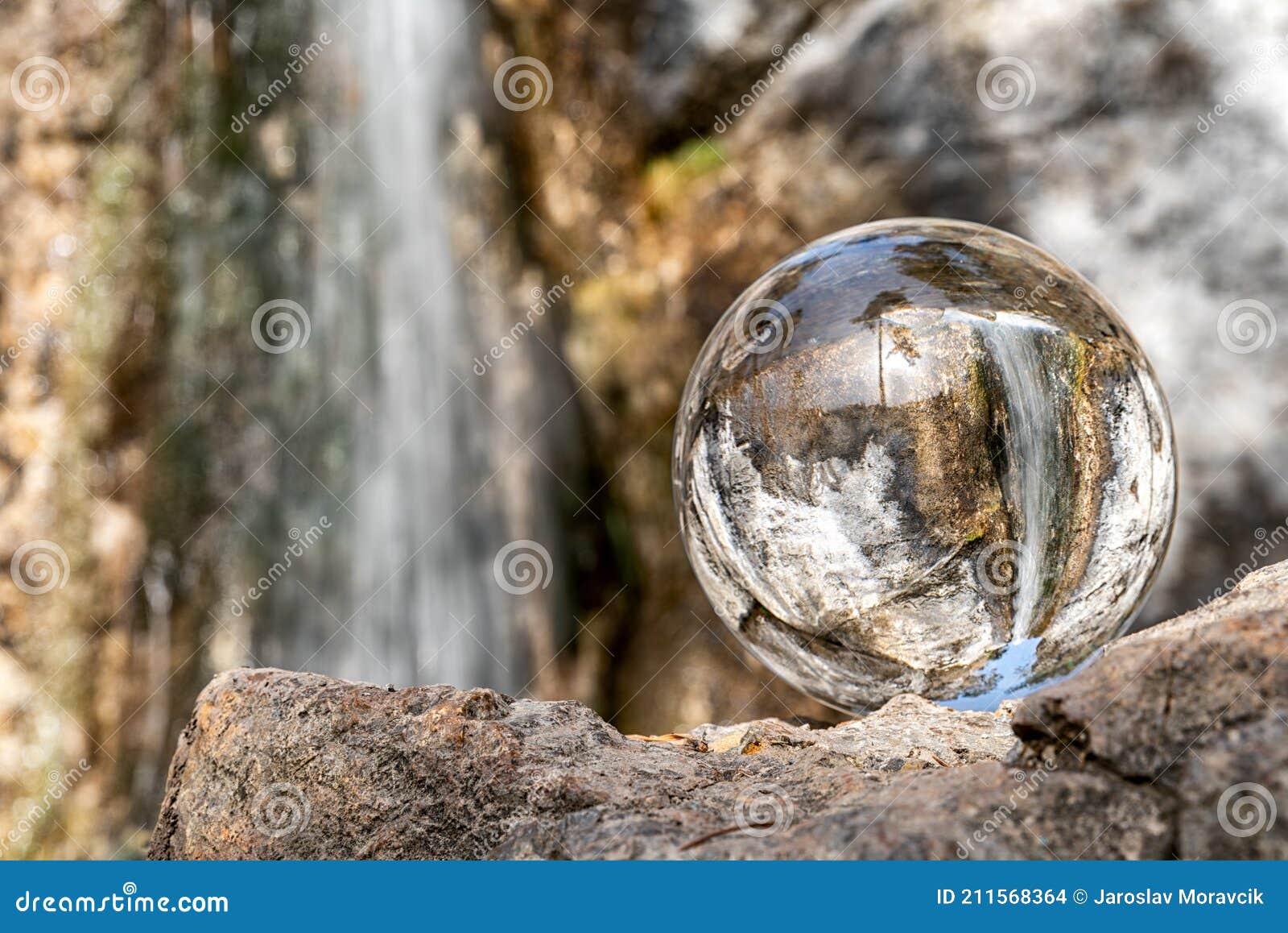 Reflection of Waterfall in Crystal Lens Ball Stock Photo - Image of ...