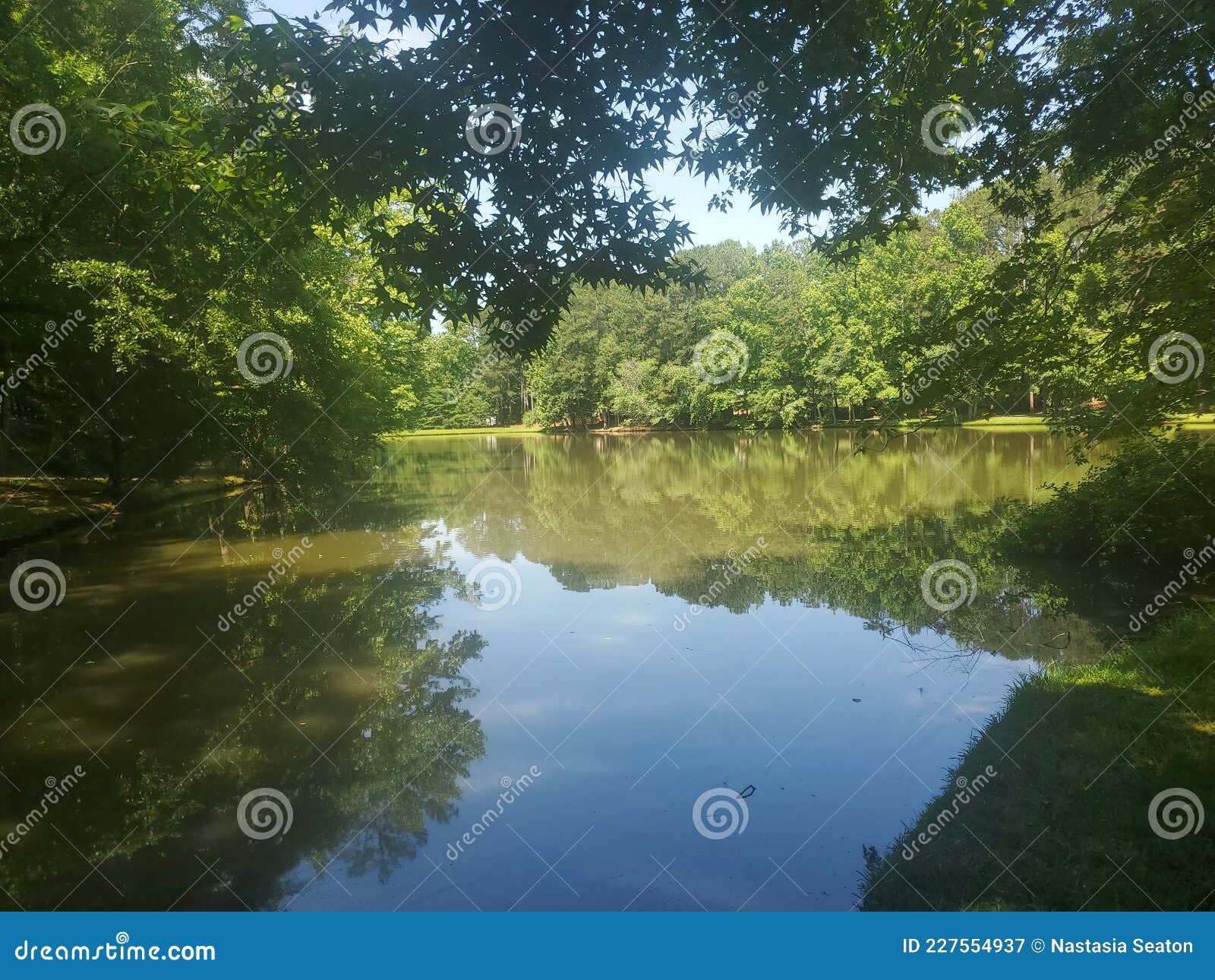 Reflection in waters stock image. Image of waterway - 227554937