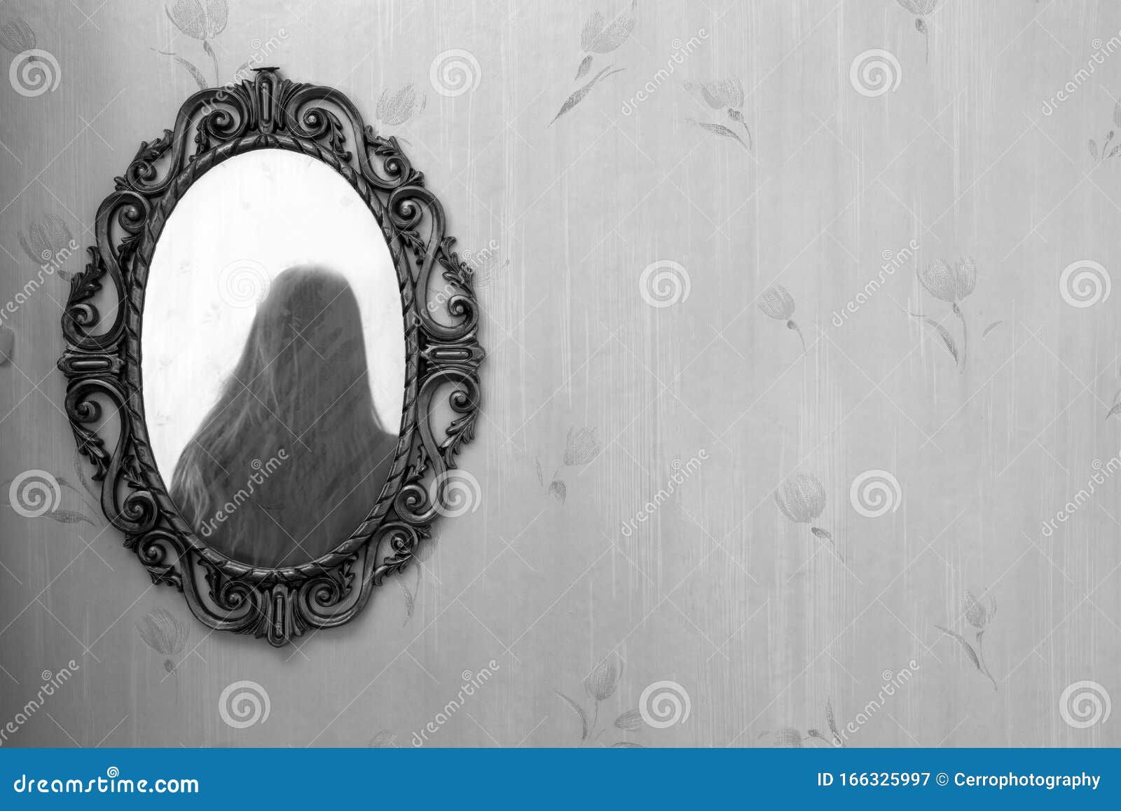 The Reflection of a Woman in a Antique Golden Mirror in the Vintage ...
