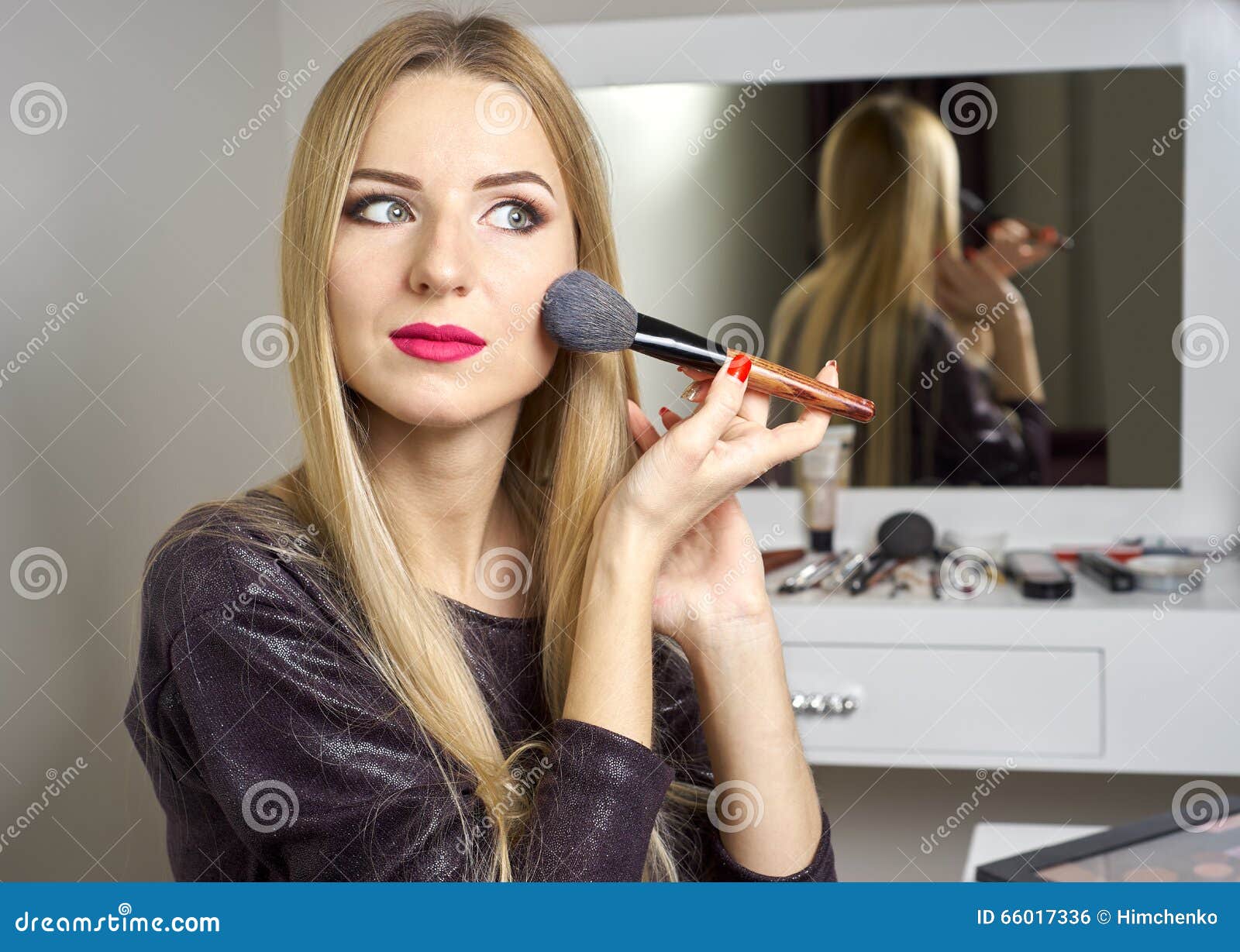 Reflection of Young Beautiful Woman Applying Her Make-up Stock Photo ...